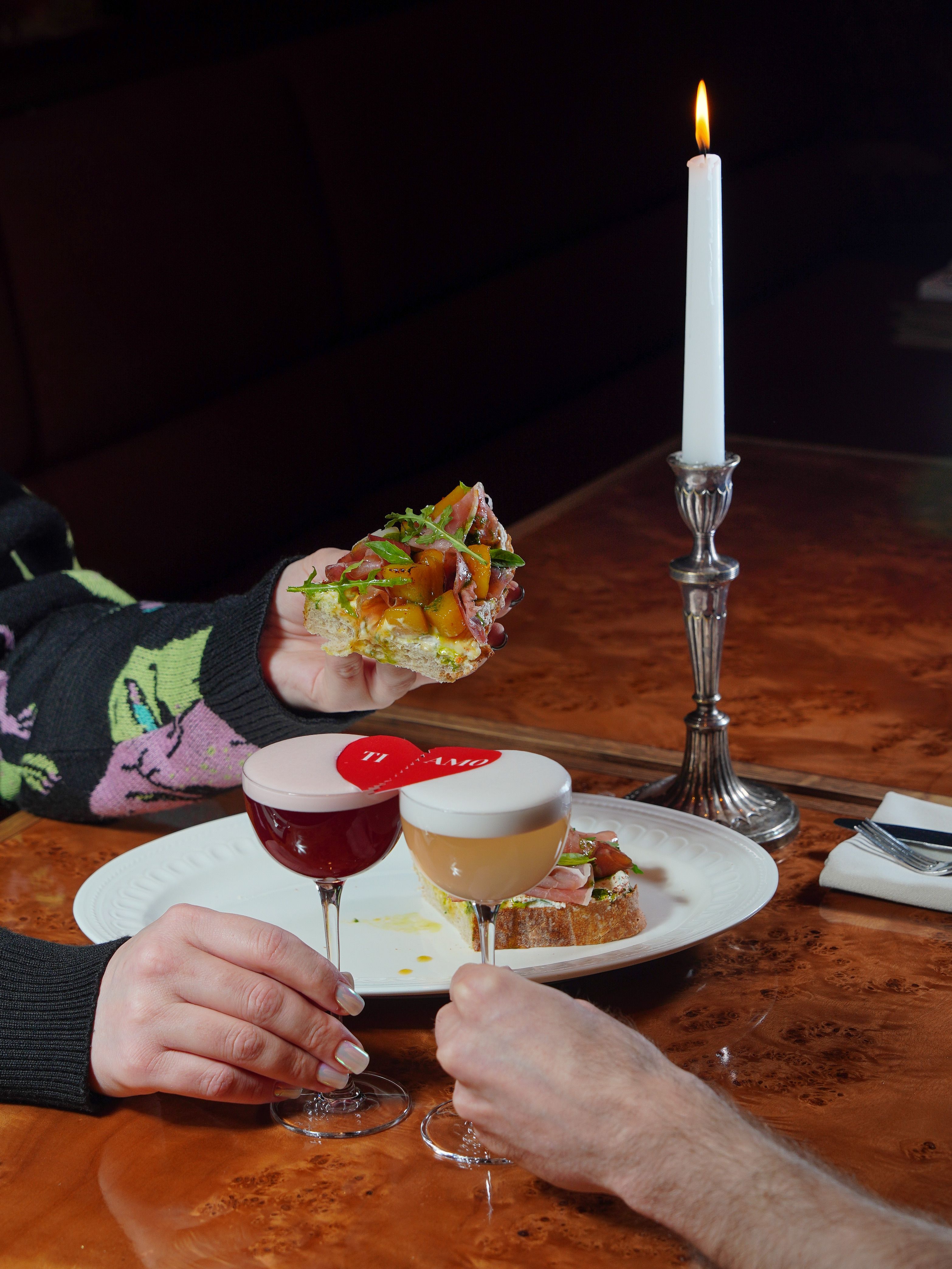 Close-up of a Couple Having a Romantic Meal · Free Stock Photo