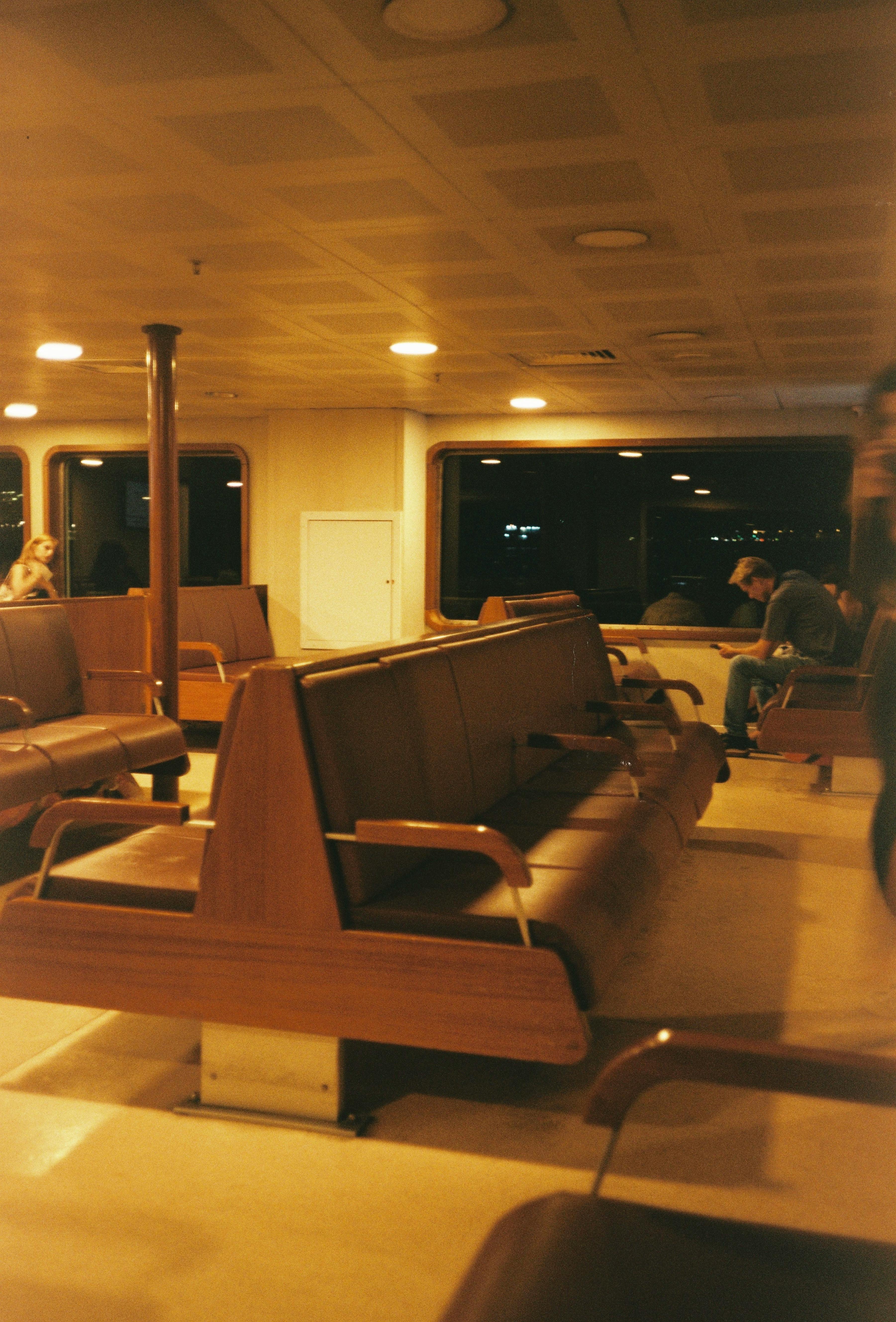 Brown Passenger Seats inside of a Ferry Boat in Istanbul · Free Stock Photo