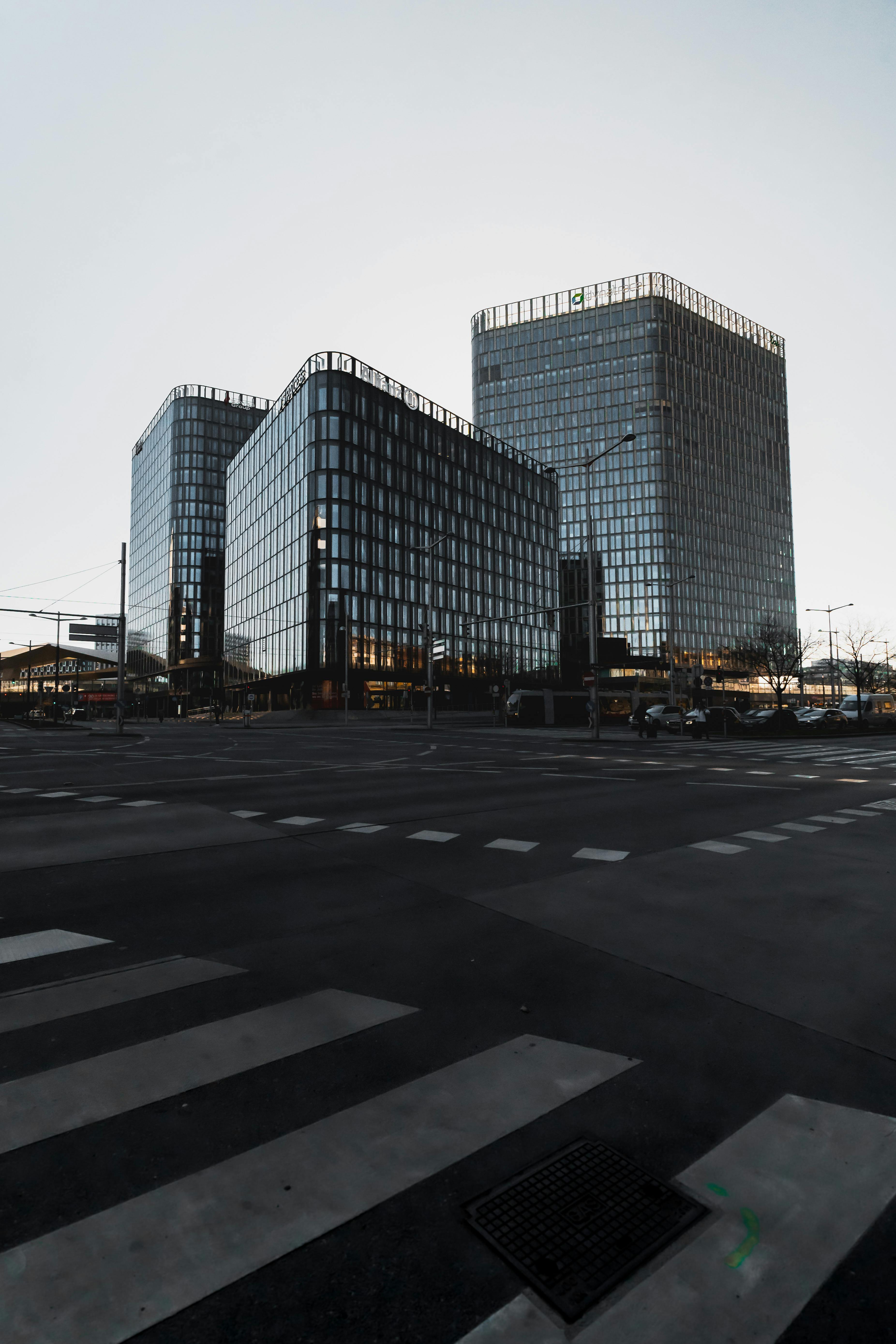 Office Buildings behind Street · Free Stock Photo