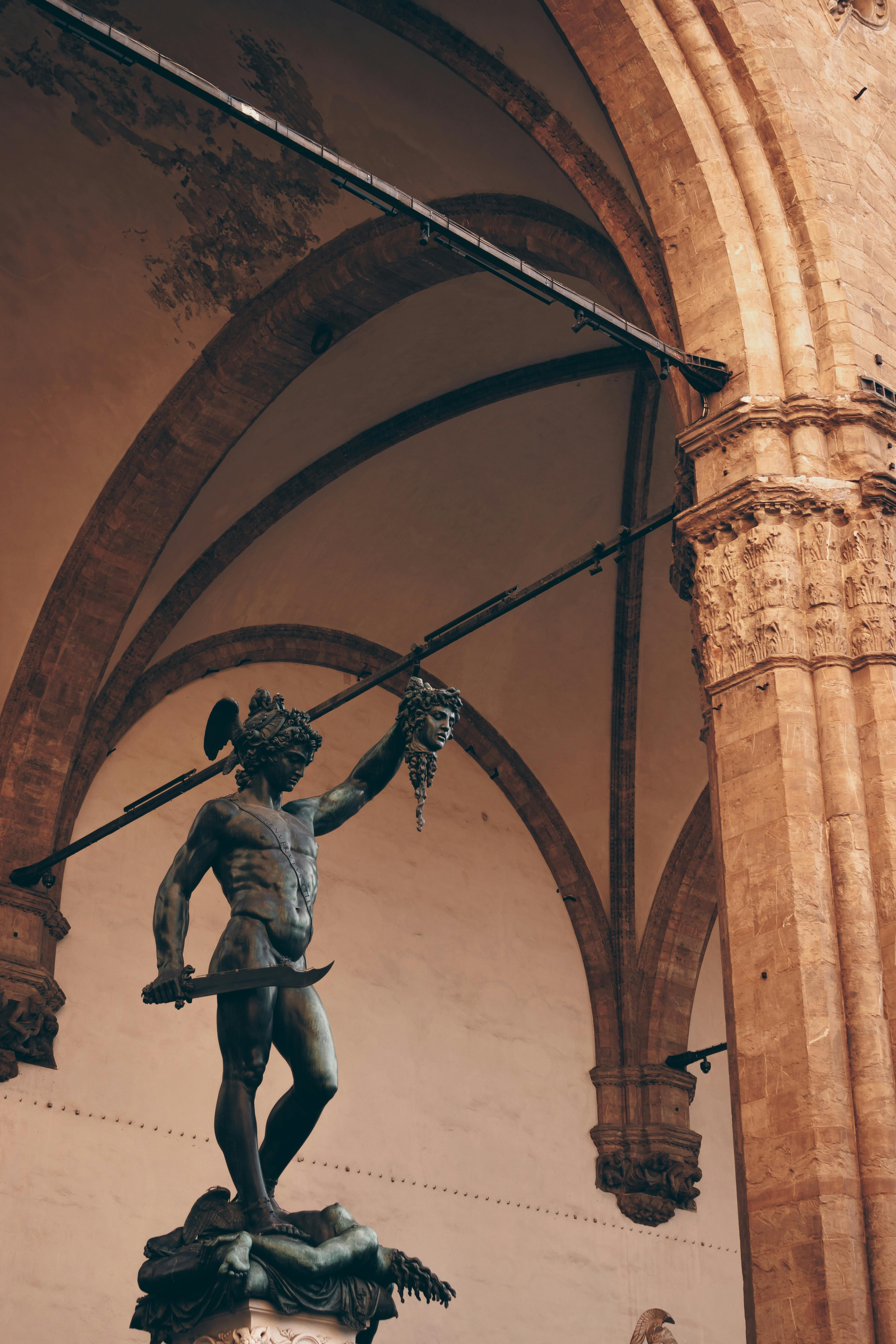 Warrior Statue behind Arch · Free Stock Photo