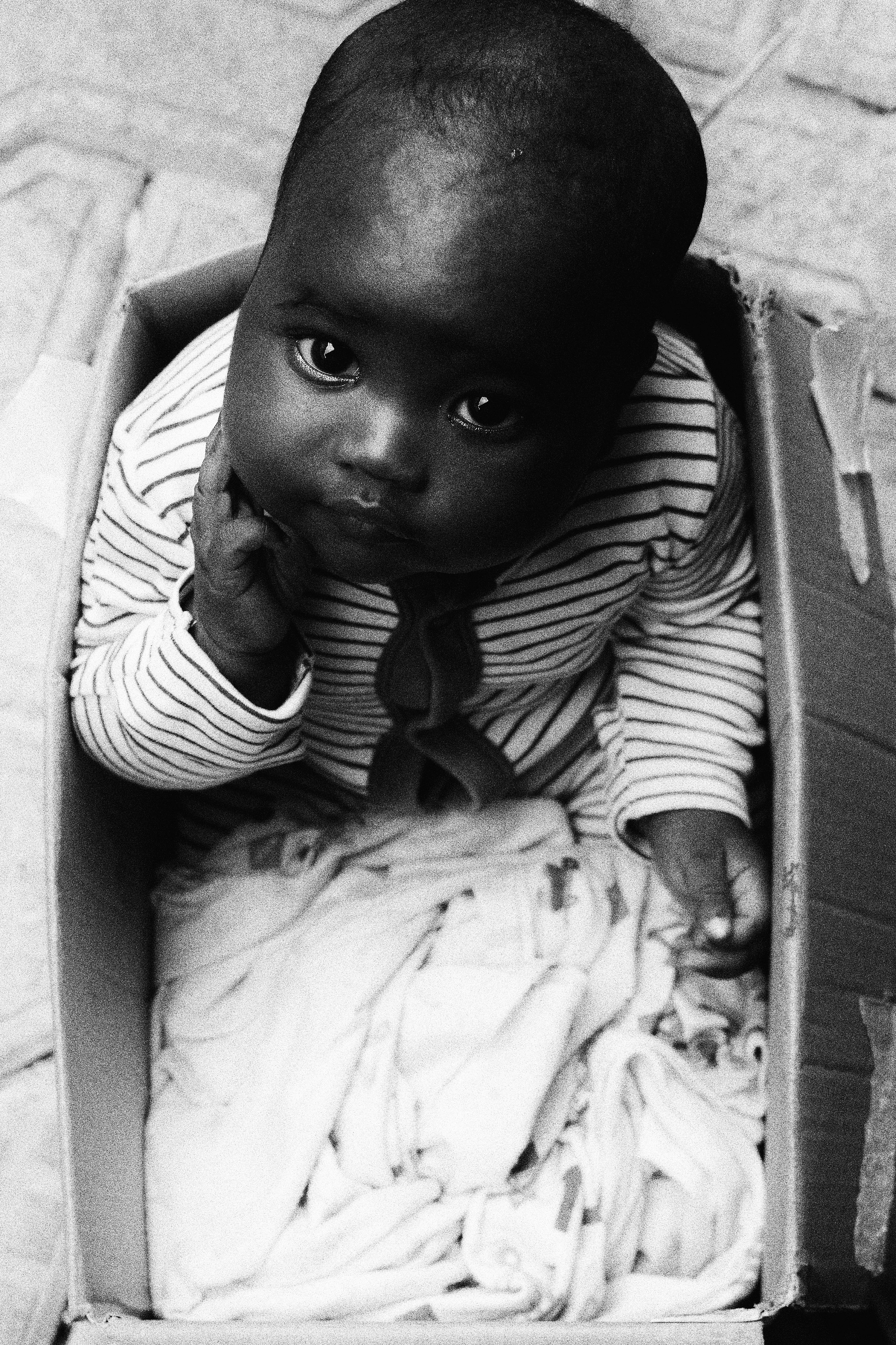 Child in Cardboard Box · Free Stock Photo