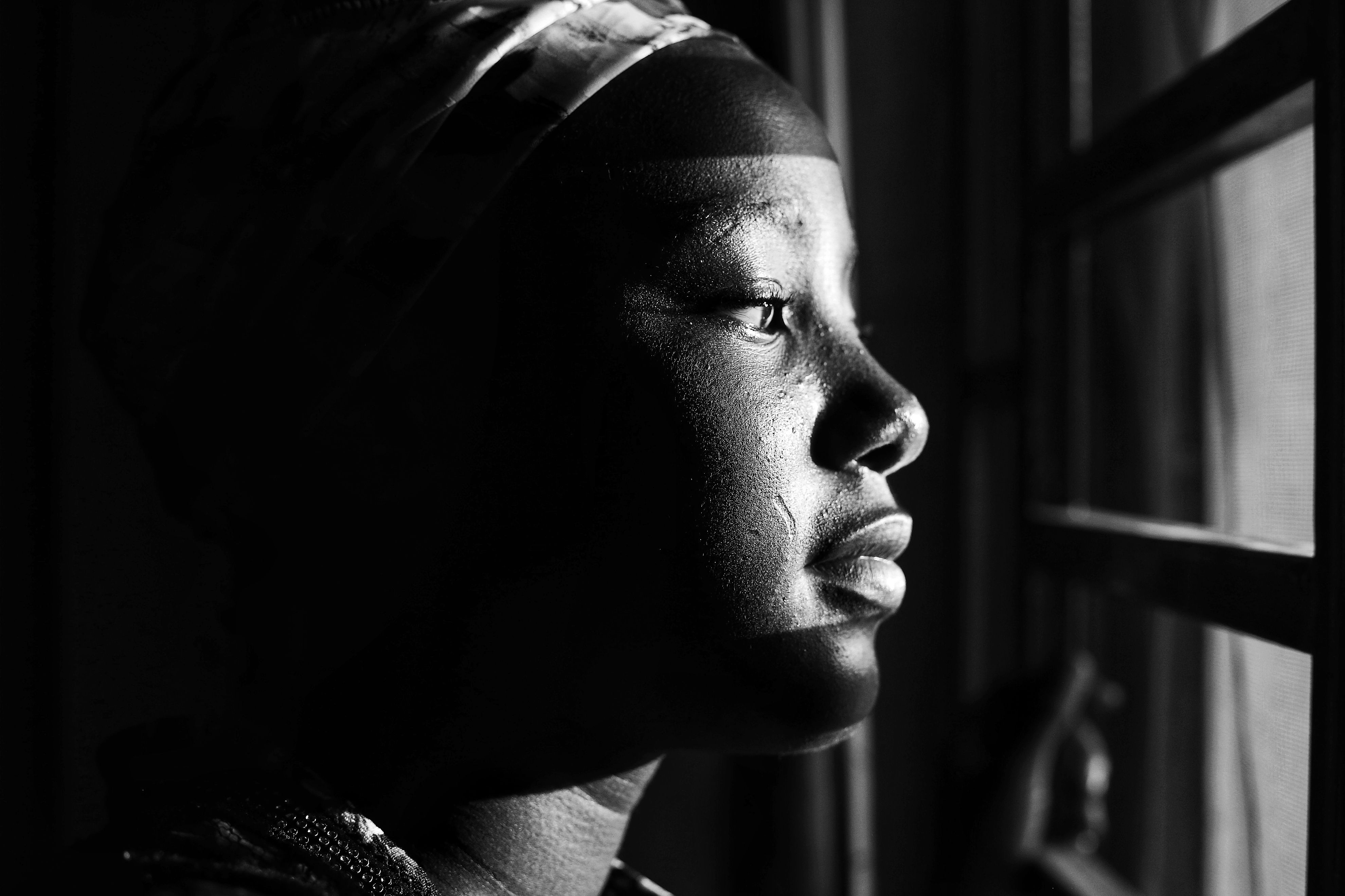 Face of Woman in Sunlight Coming through Window · Free Stock Photo