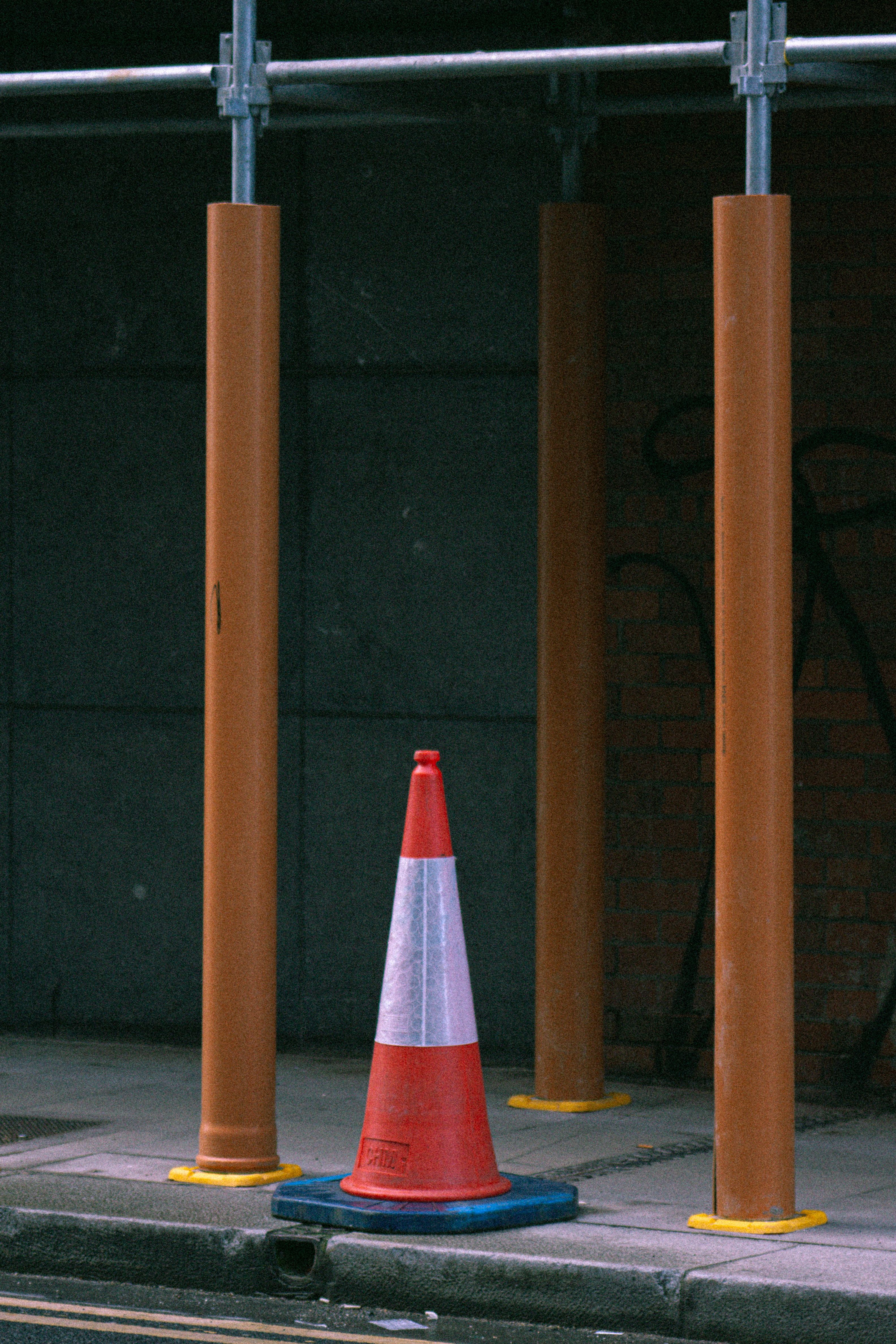 A traffic cone sitting on top of a pole · Free Stock Photo