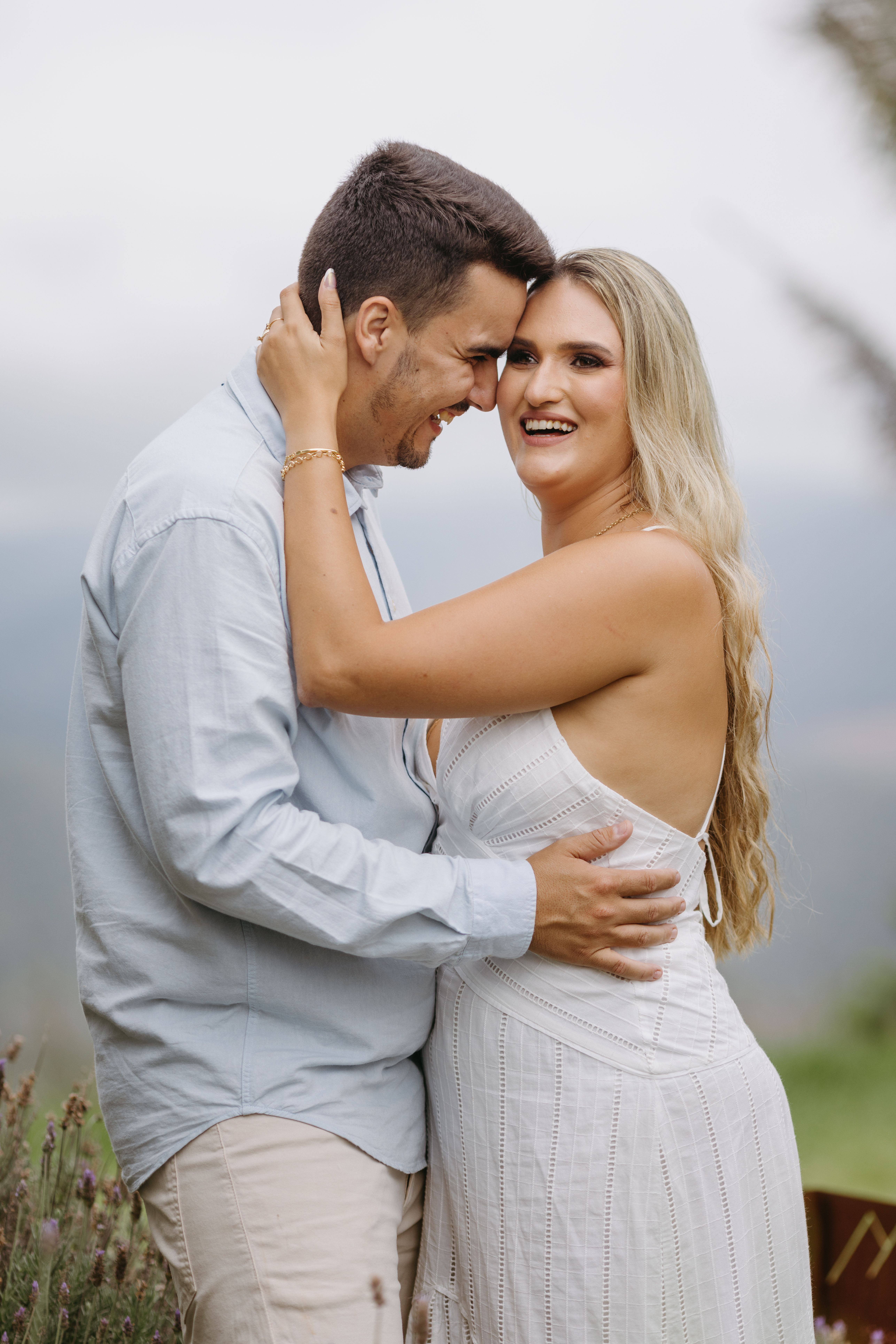 Portrait of Smiling Couple Hugging · Free Stock Photo