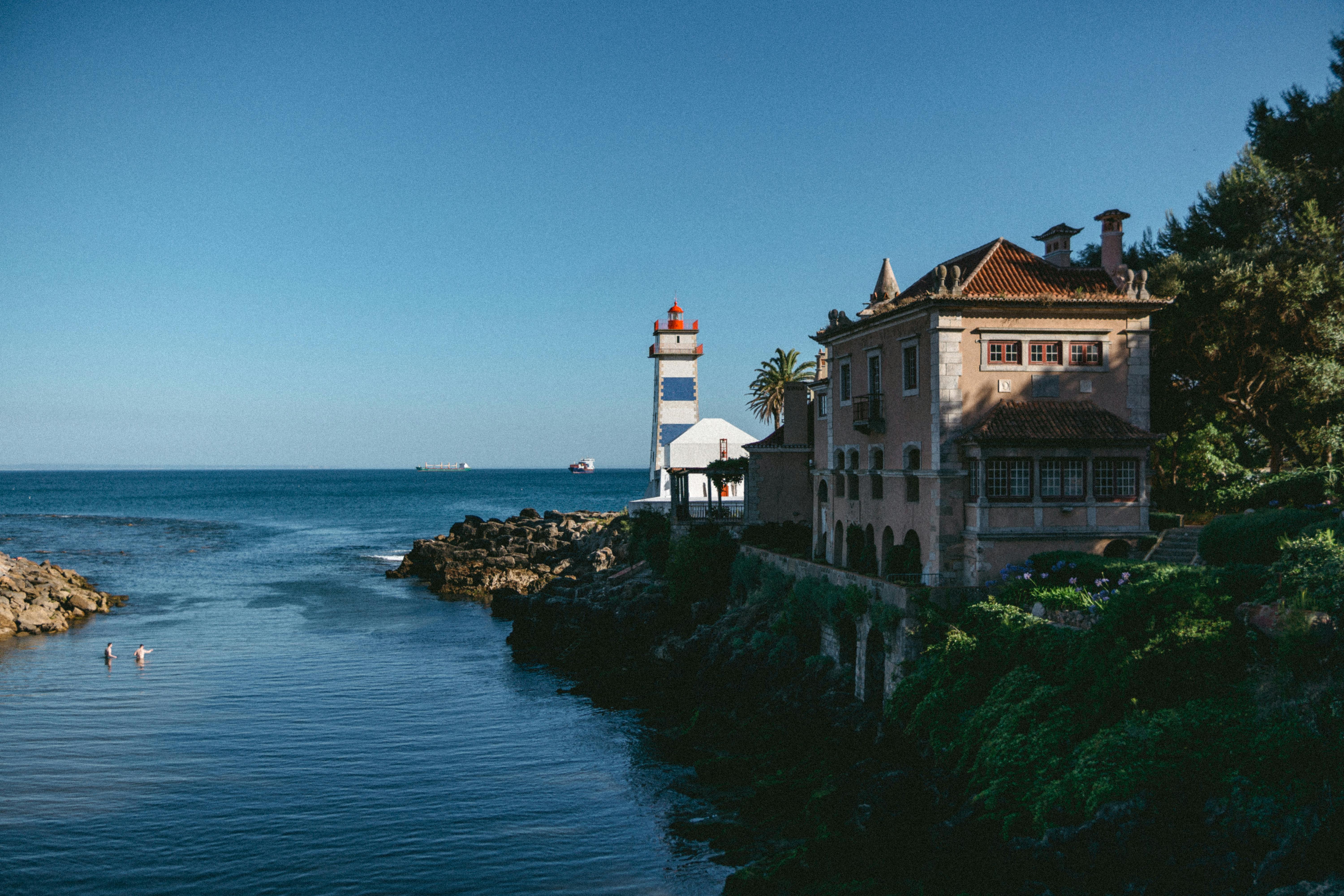 Lighthouse and Santa Maria House Museum on Sea Shore in Portugal · Free ...