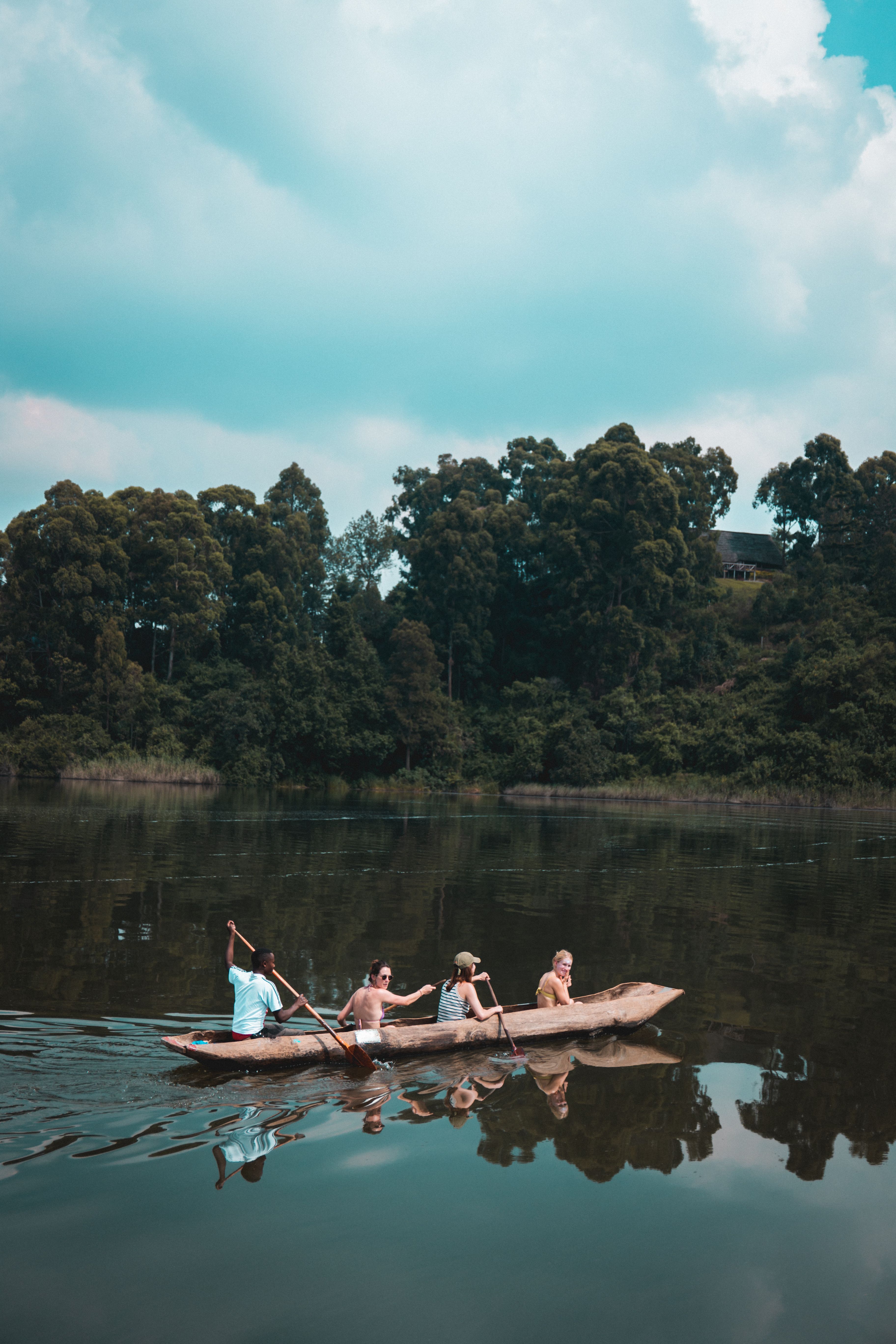 Man and Women Boating on Lake · Free Stock Photo