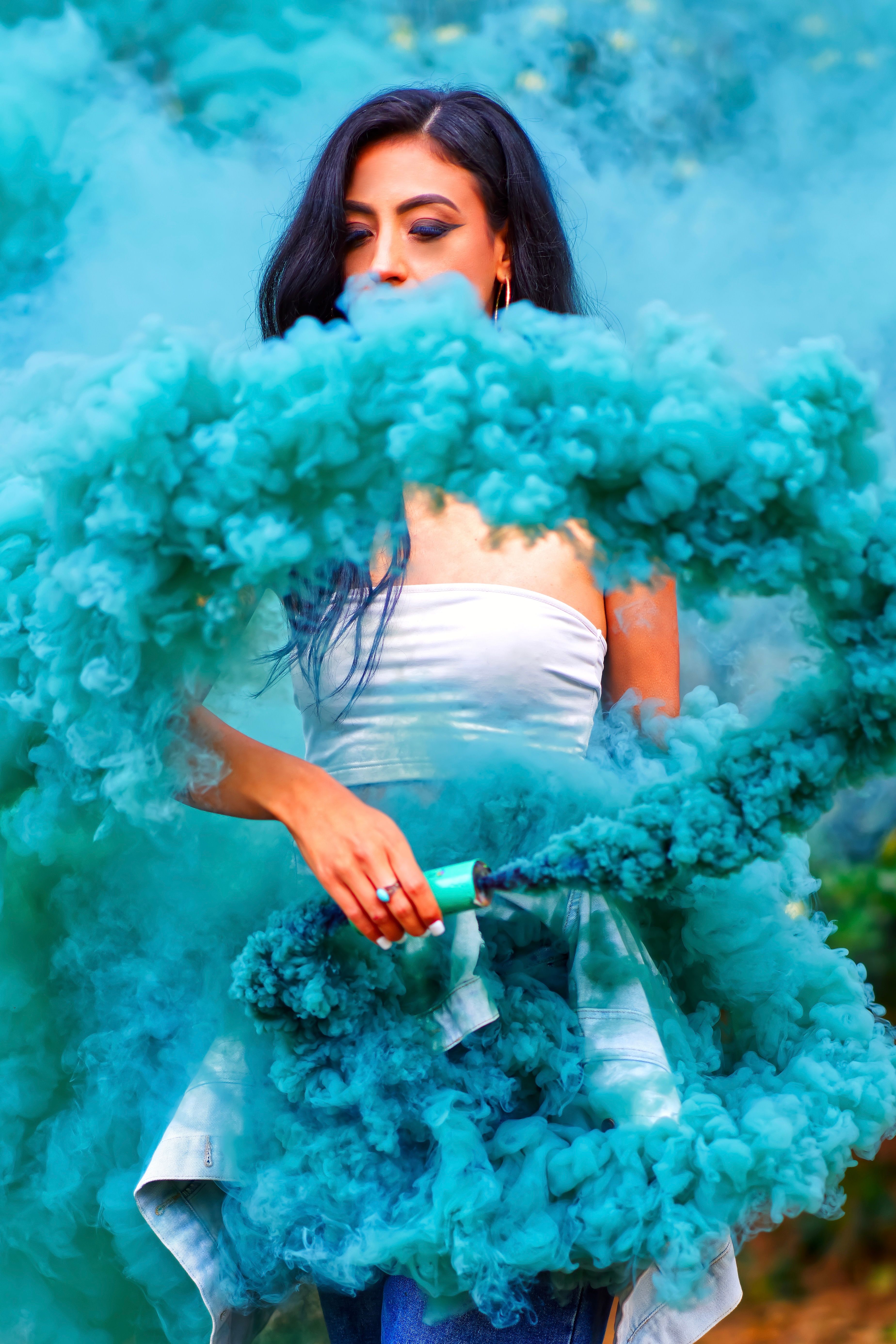 Woman Standing on Orange and Blue Smoke · Free Stock Photo