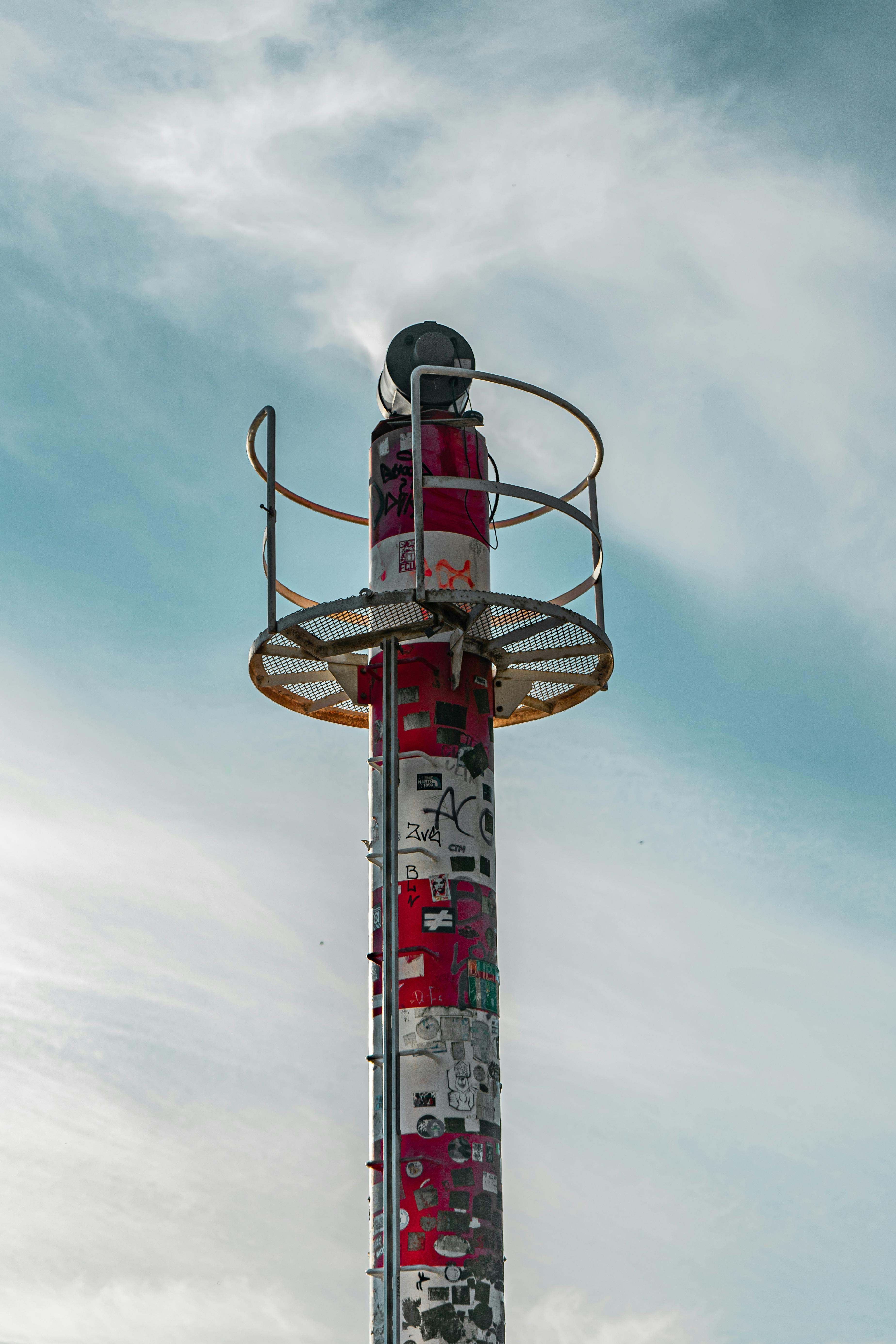 Red and White Lighthouse Pole · Free Stock Photo