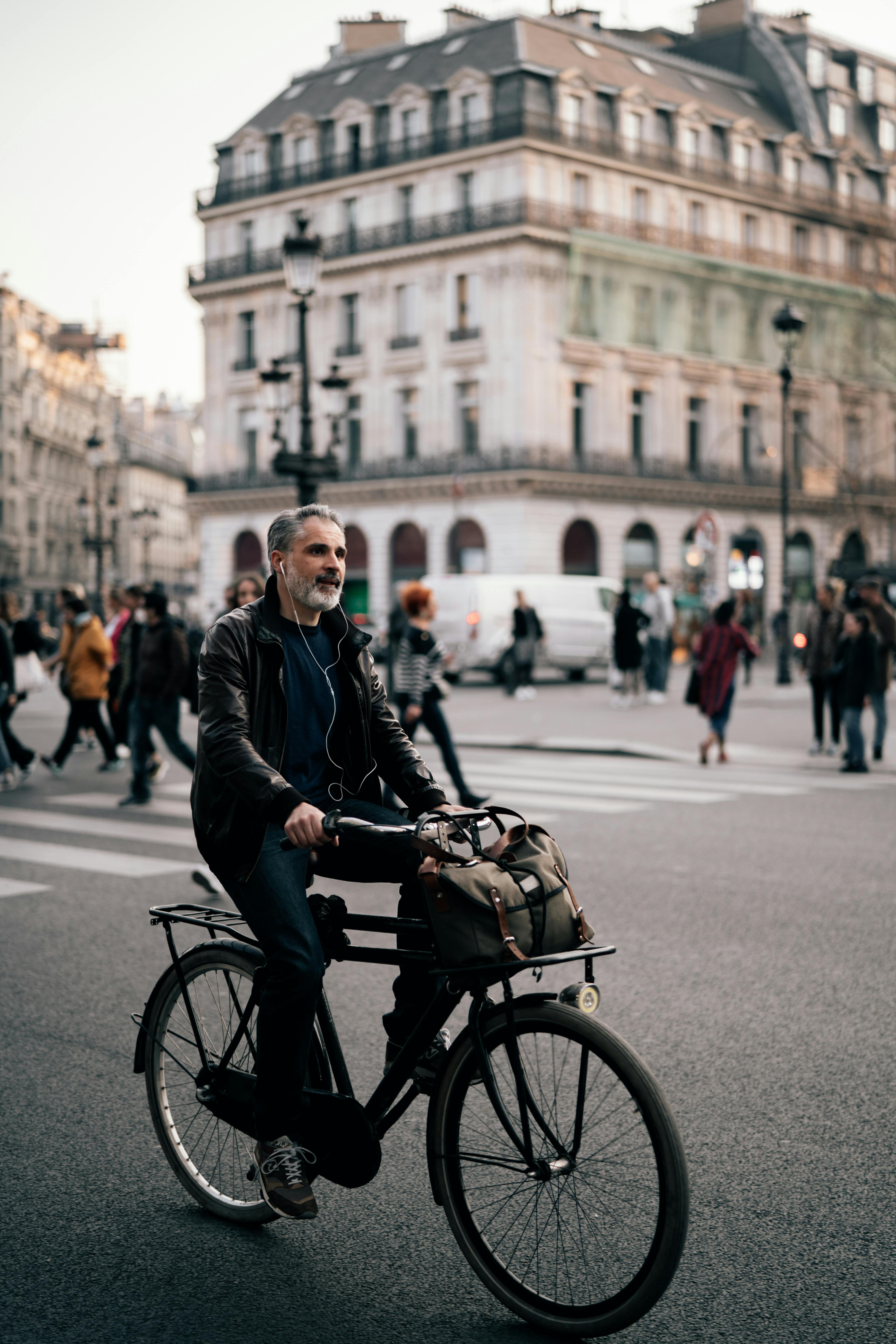 Person Riding on Bicycle · Free Stock Photo