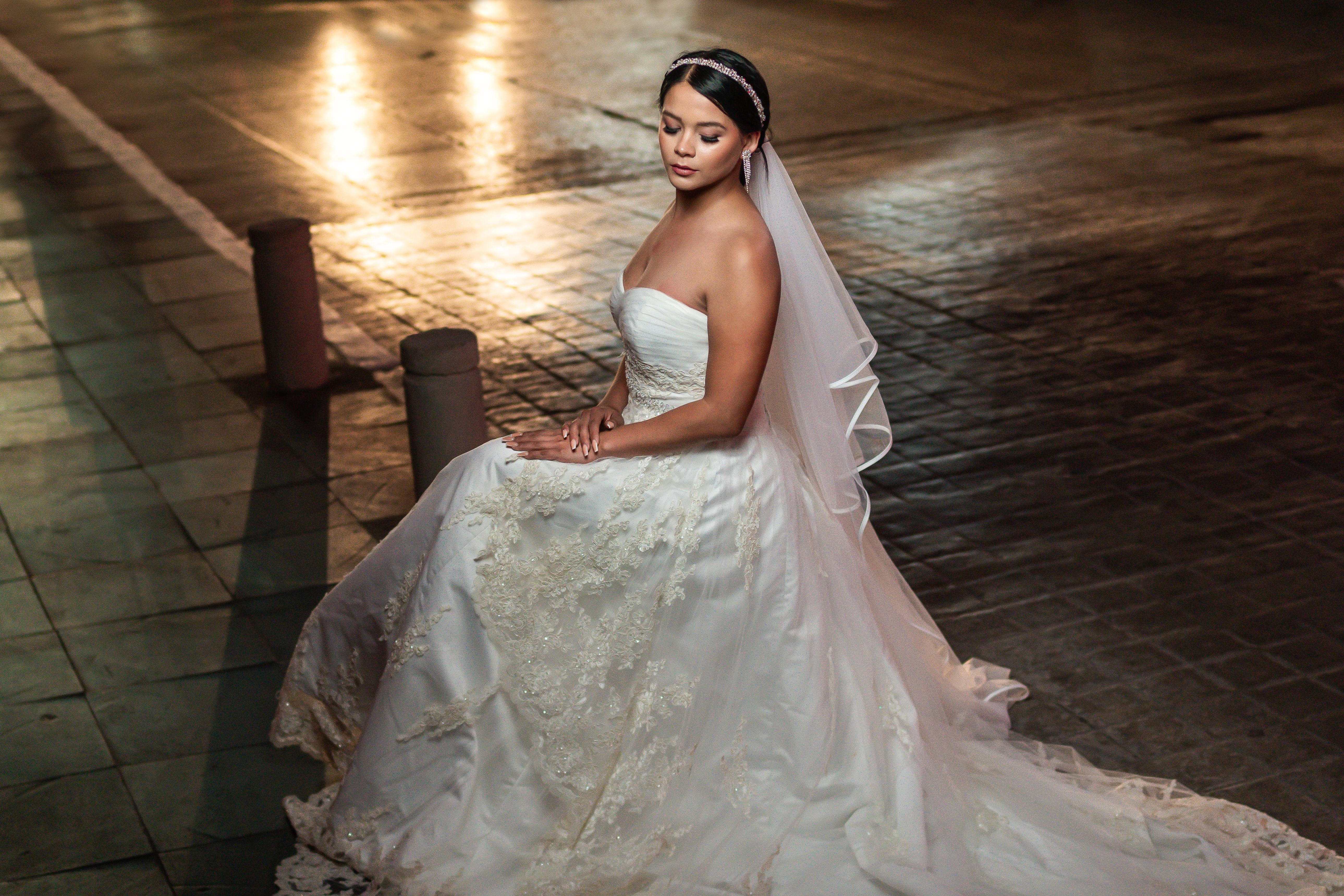Brunette Bride Sitting in Wedding Dress · Free Stock Photo