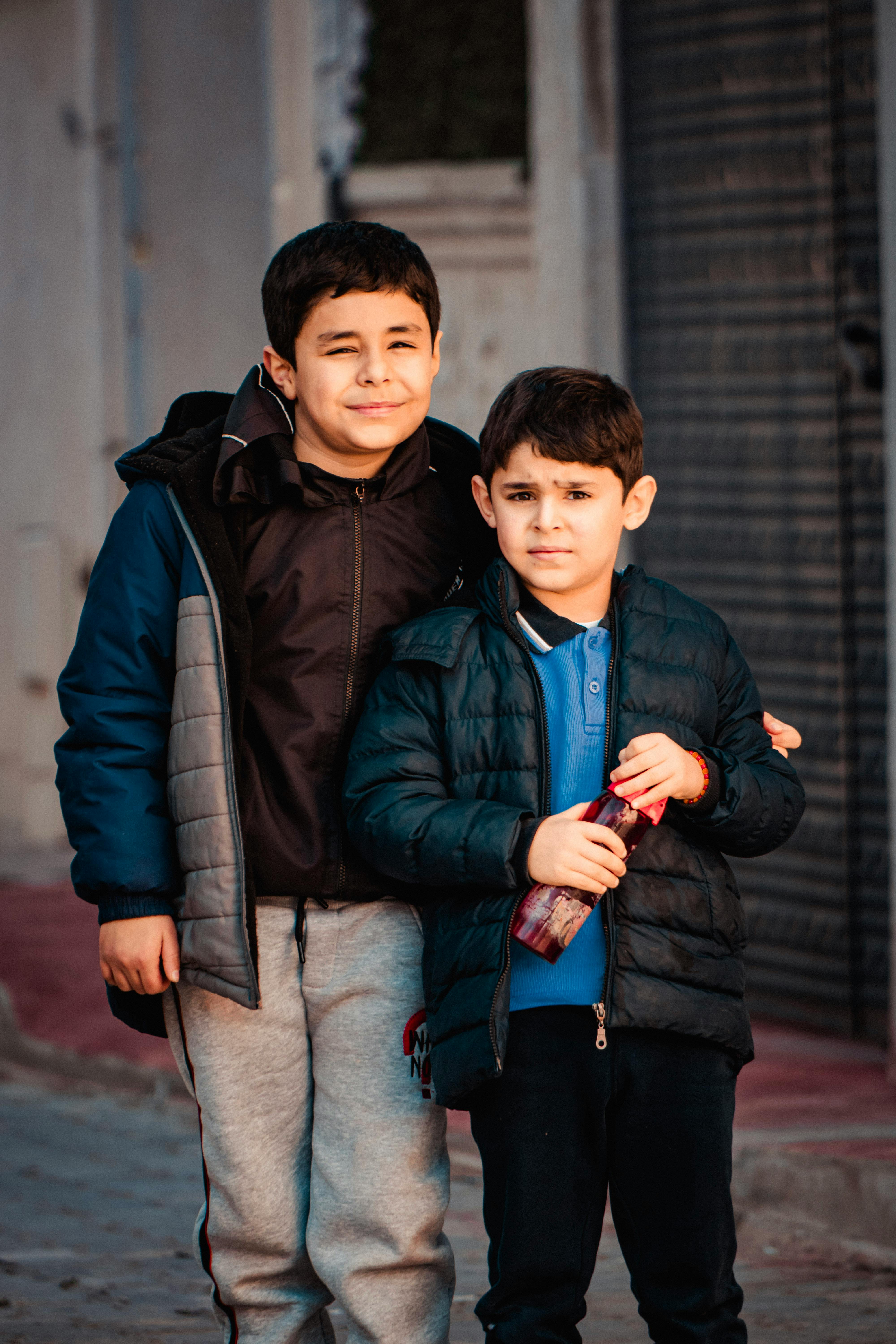 Two Boys Standing Together · Free Stock Photo