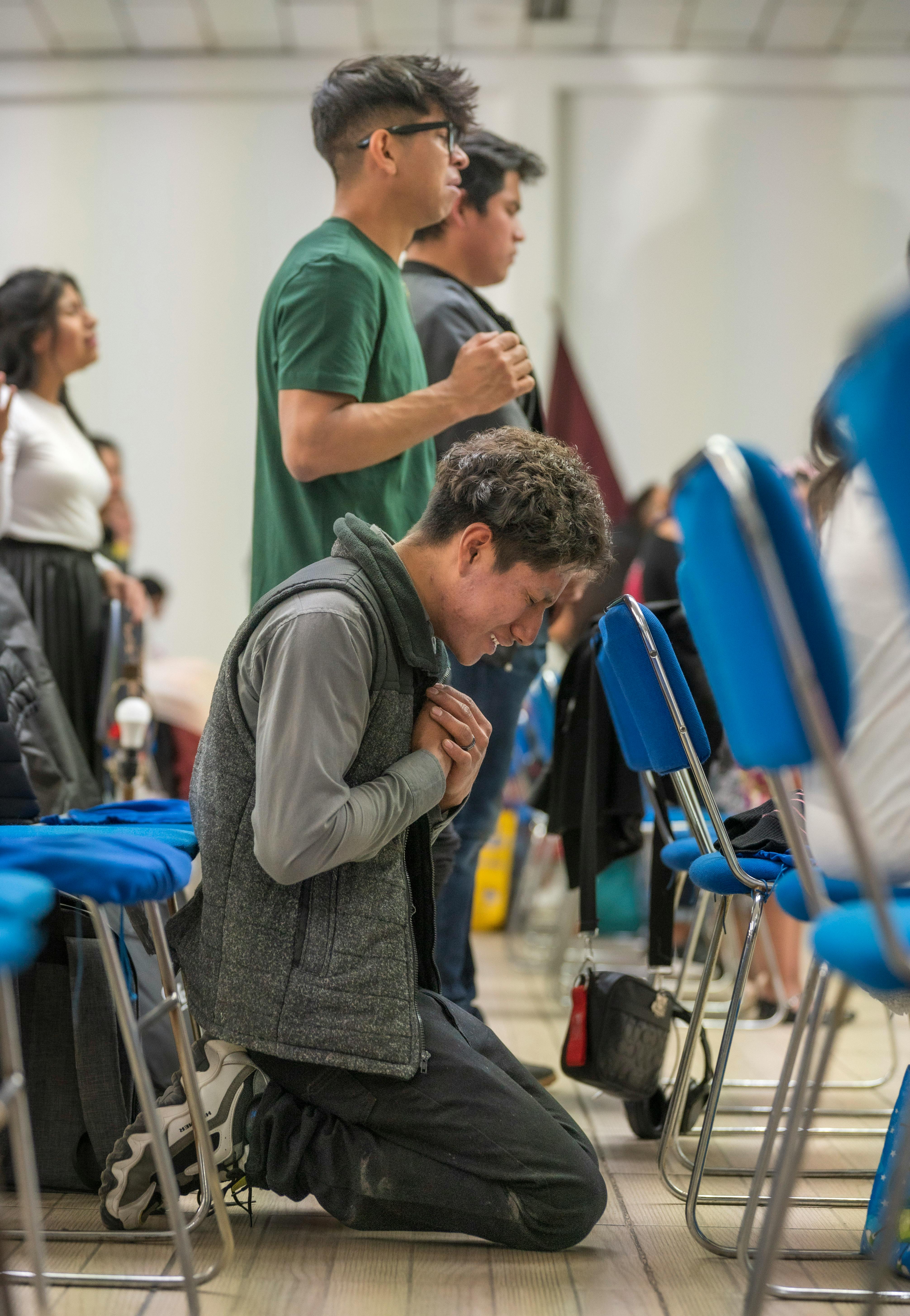 Young People Praying in an Classroom · Free Stock Photo
