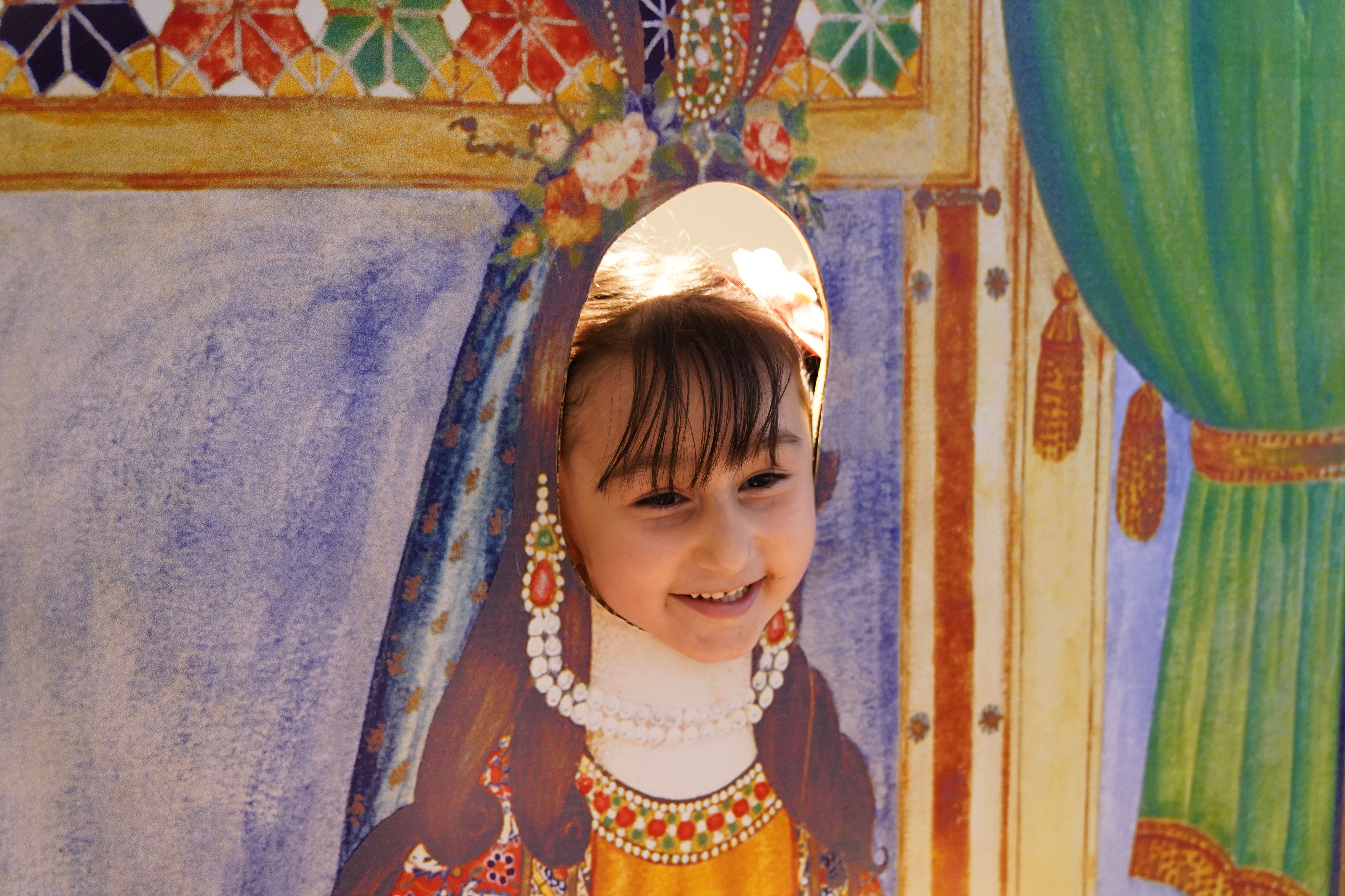 A young girl dressed in a traditional costume · Free Stock Photo