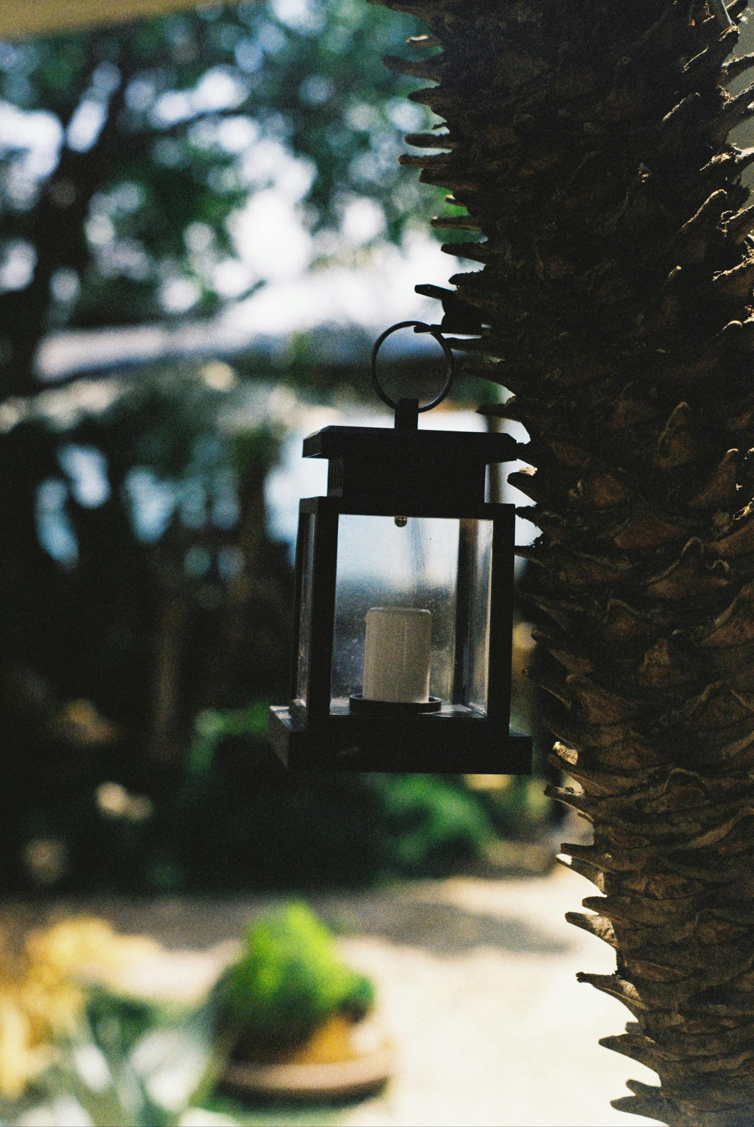 Close-Up Shot of a Lamp Hanging on a Wall · Free Stock Photo