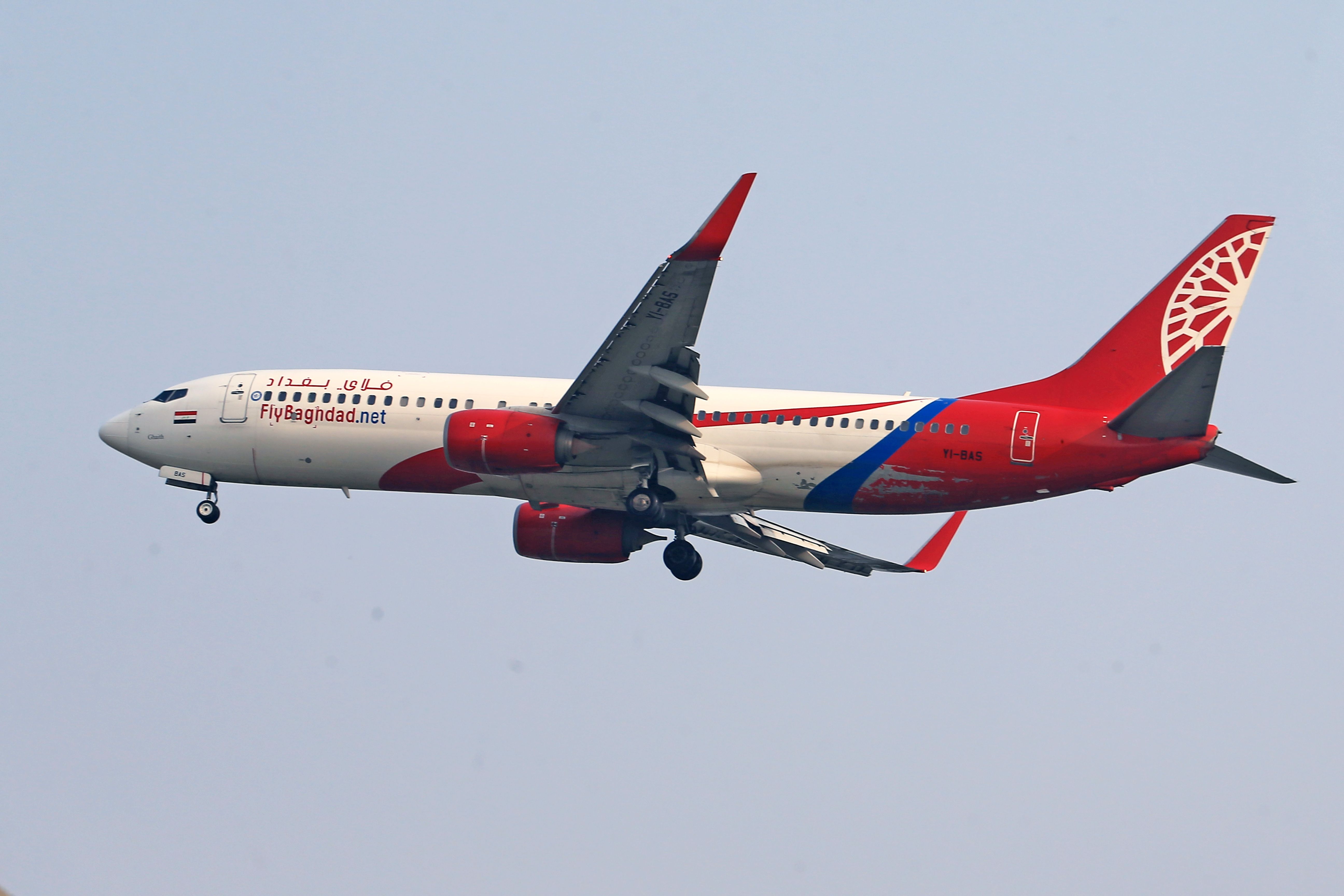 Boeing 737 Airliner with Landing Gear Lowered · Free Stock Photo