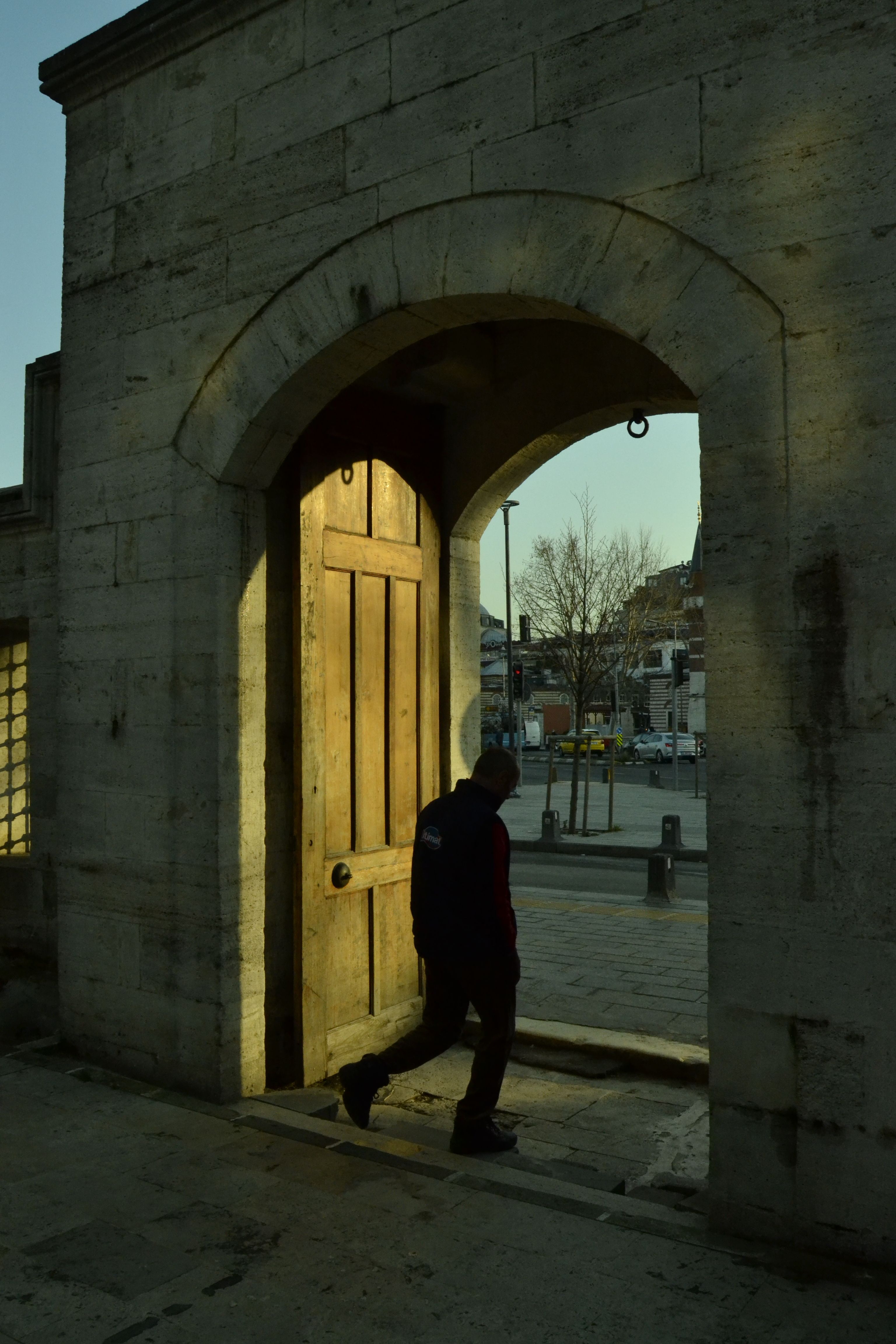 A Man Walking Through a Door · Free Stock Photo