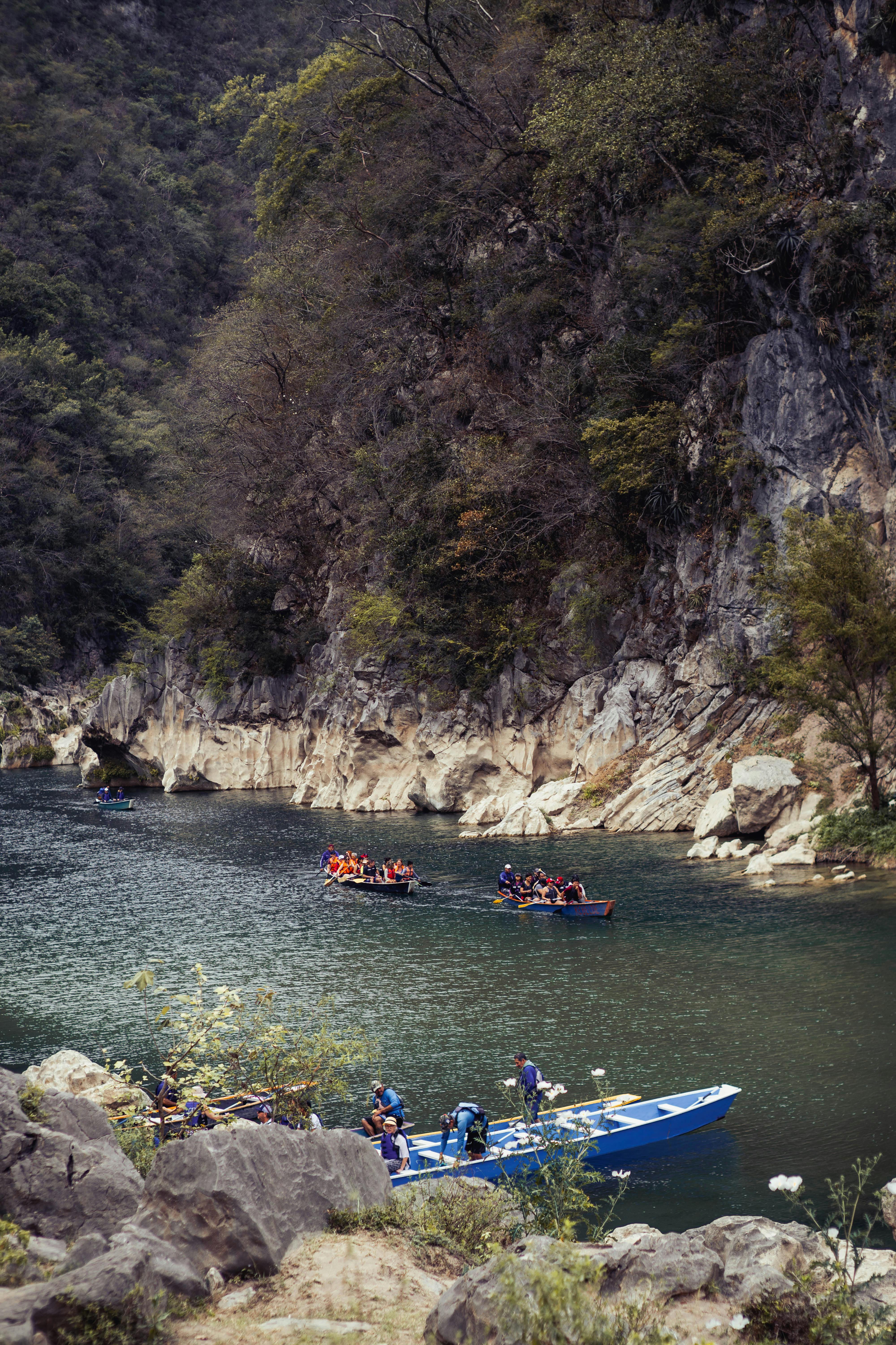 Travelers Floating Down River · Free Stock Photo