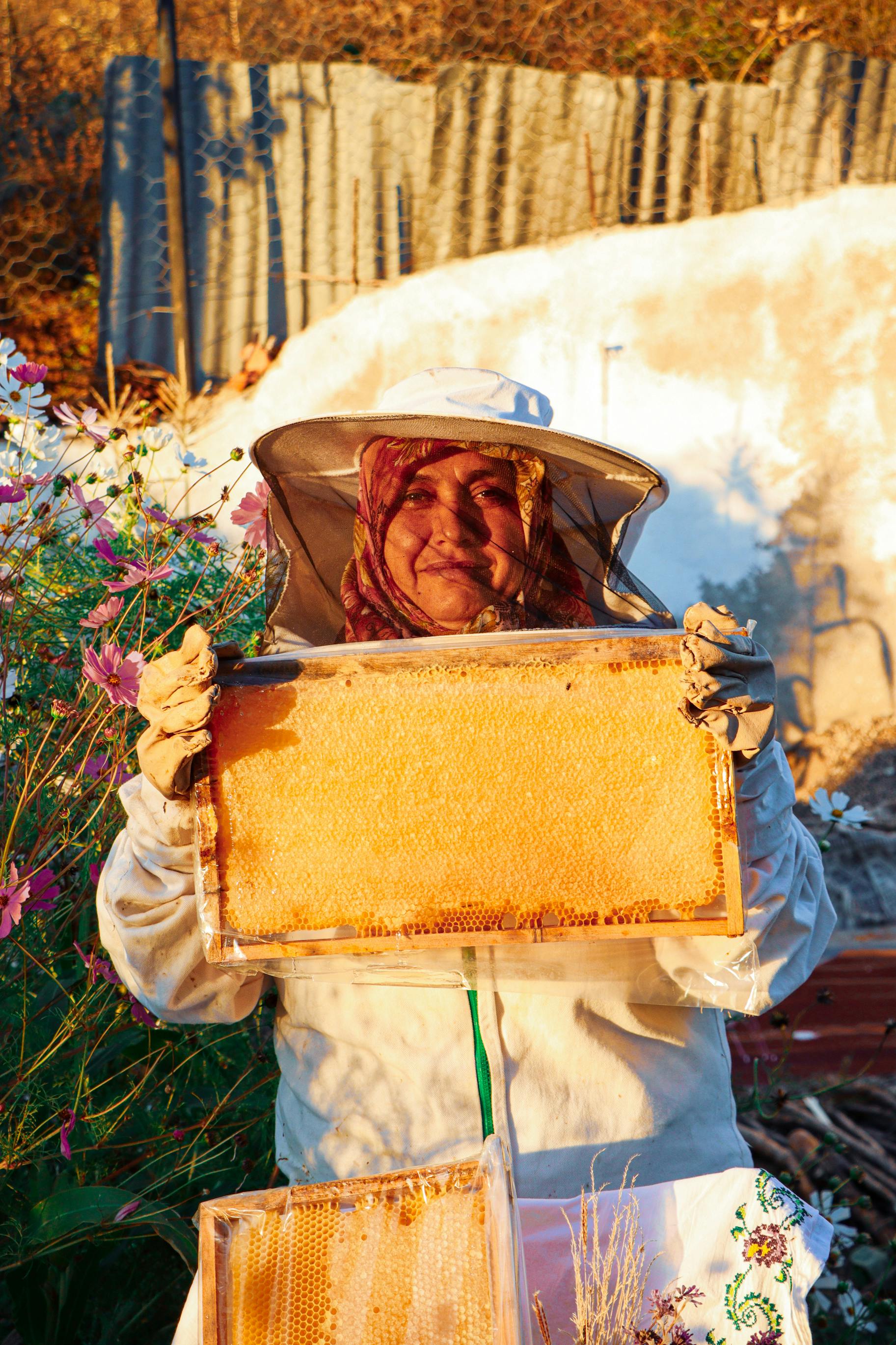 Smiling Beekeeper Woman · Free Stock Photo