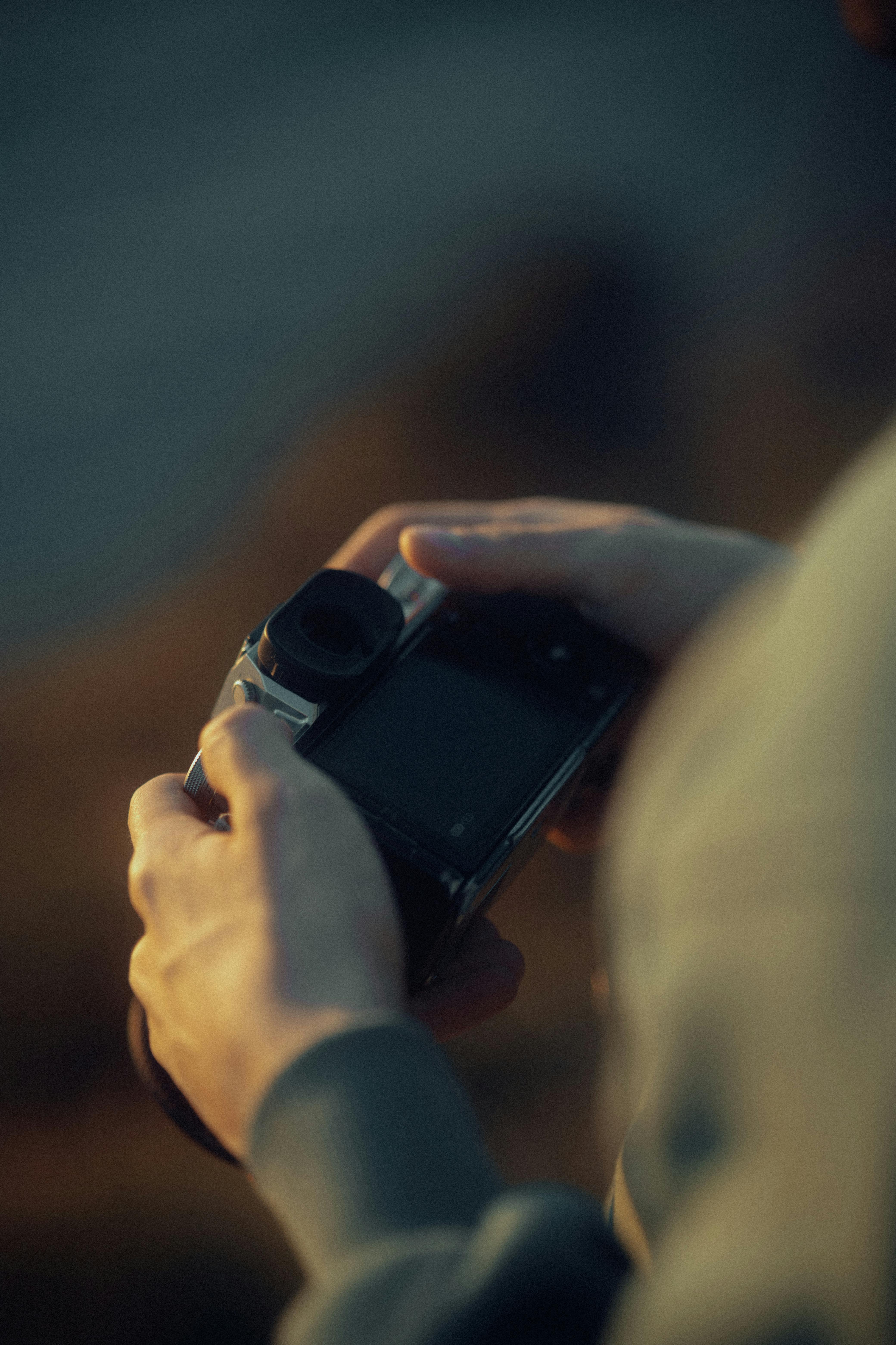 Hands Holding Camera · Free Stock Photo