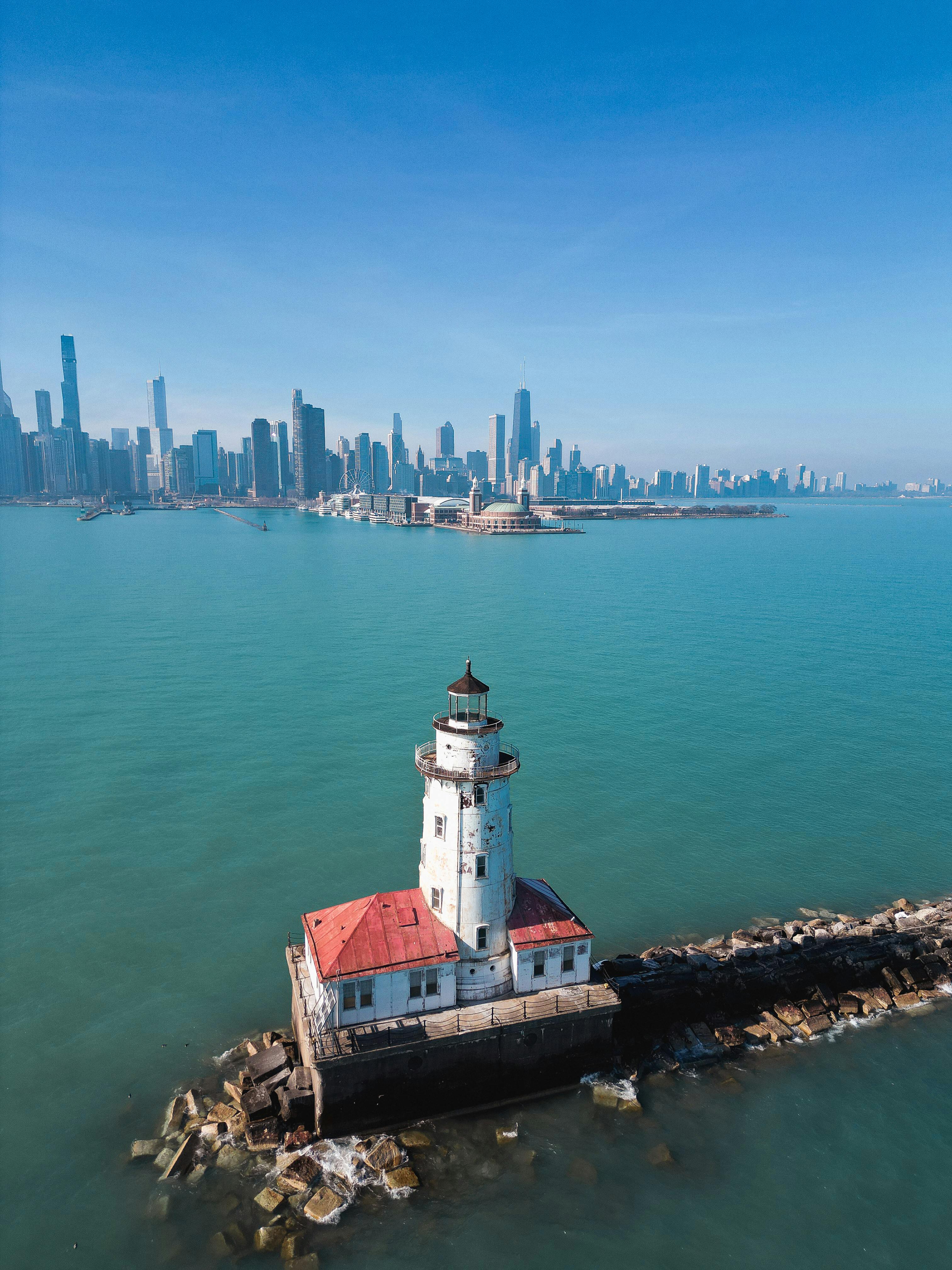 Aerial View of the Chicago Harbor Light and Chicago Skyline in the ...