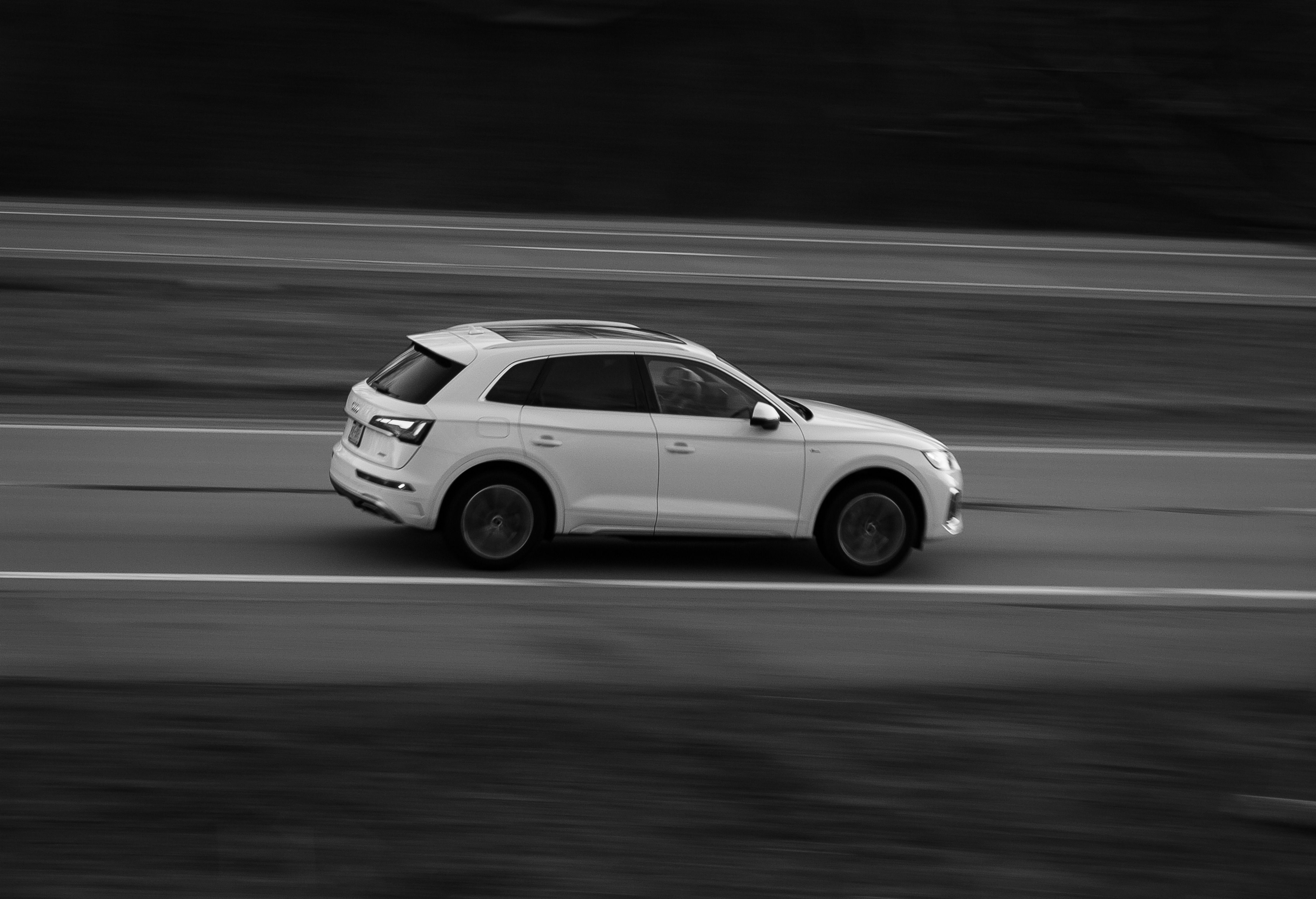 White Car Driven on Road · Free Stock Photo