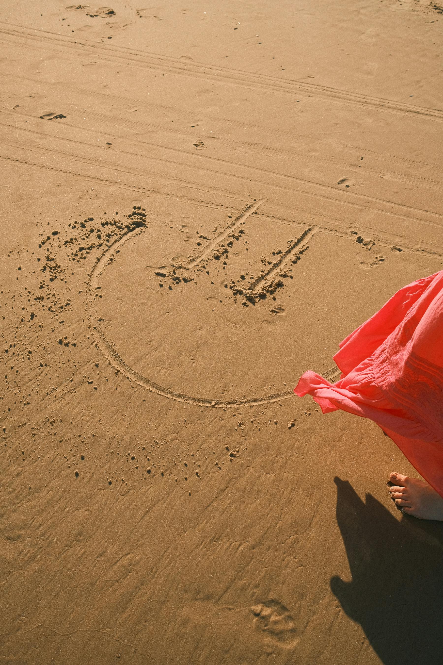 Smile on Beach Sand · Free Stock Photo