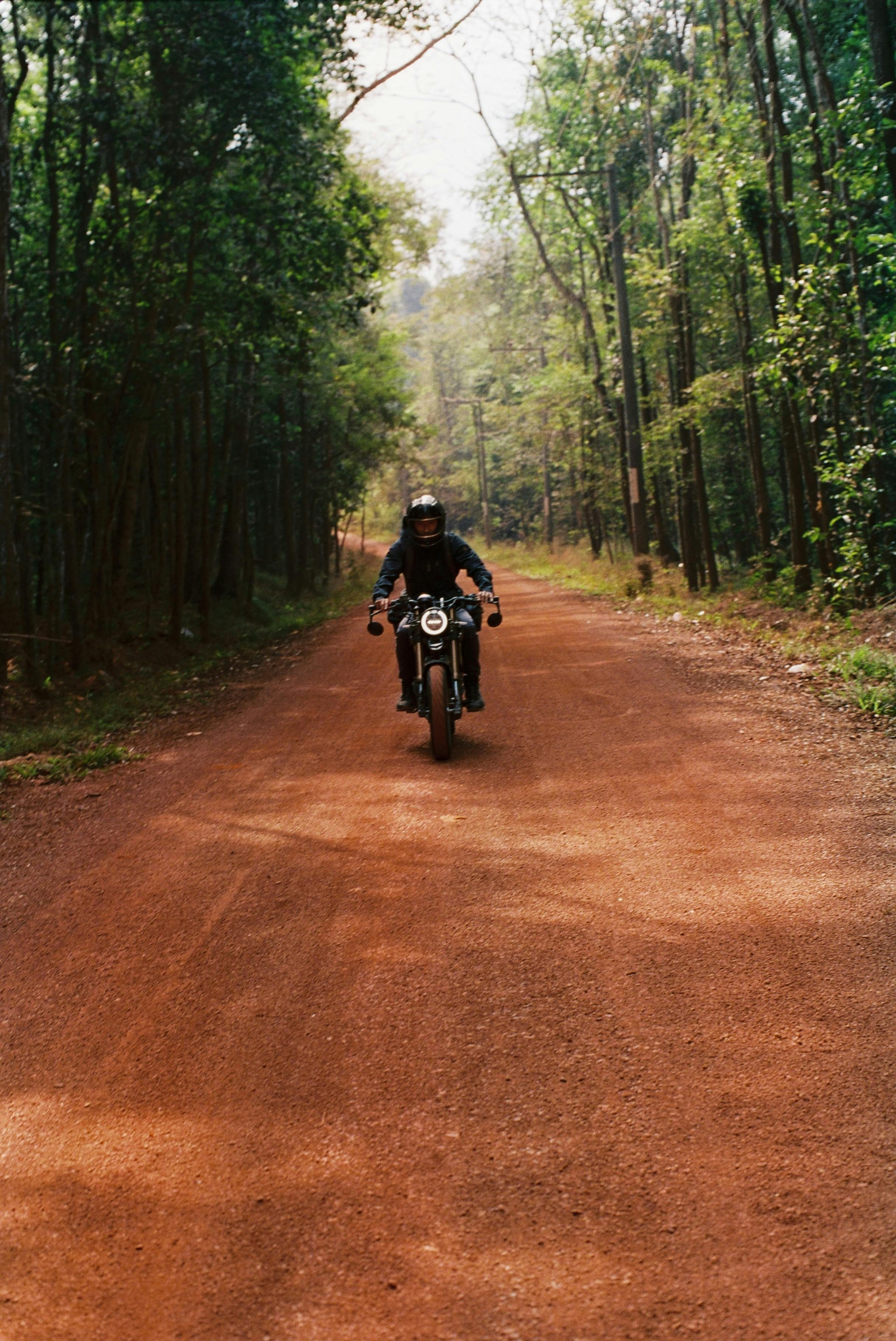 Man Riding A Moped · Free Stock Photo