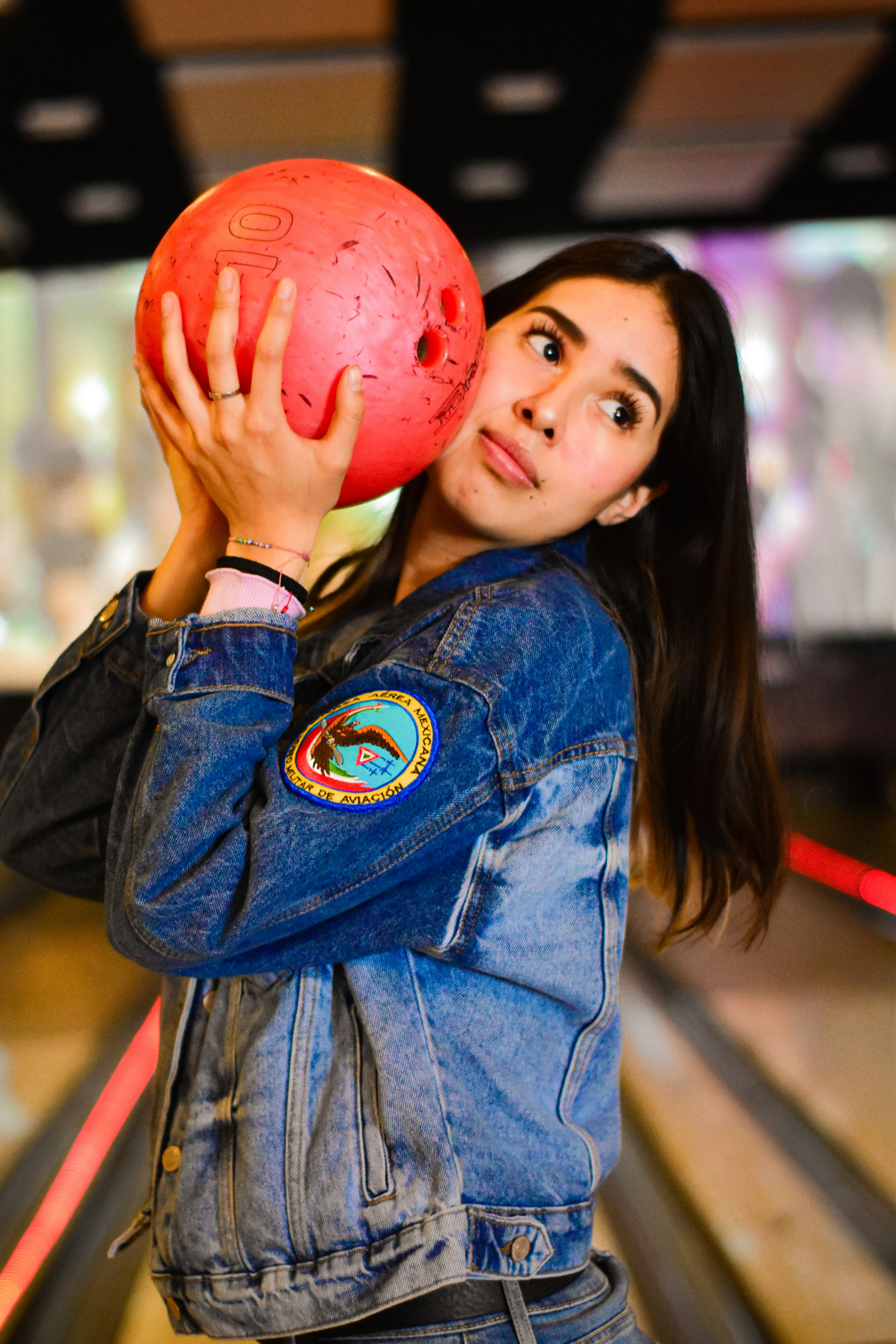 A Woman with a Bowling Ball · Free Stock Photo
