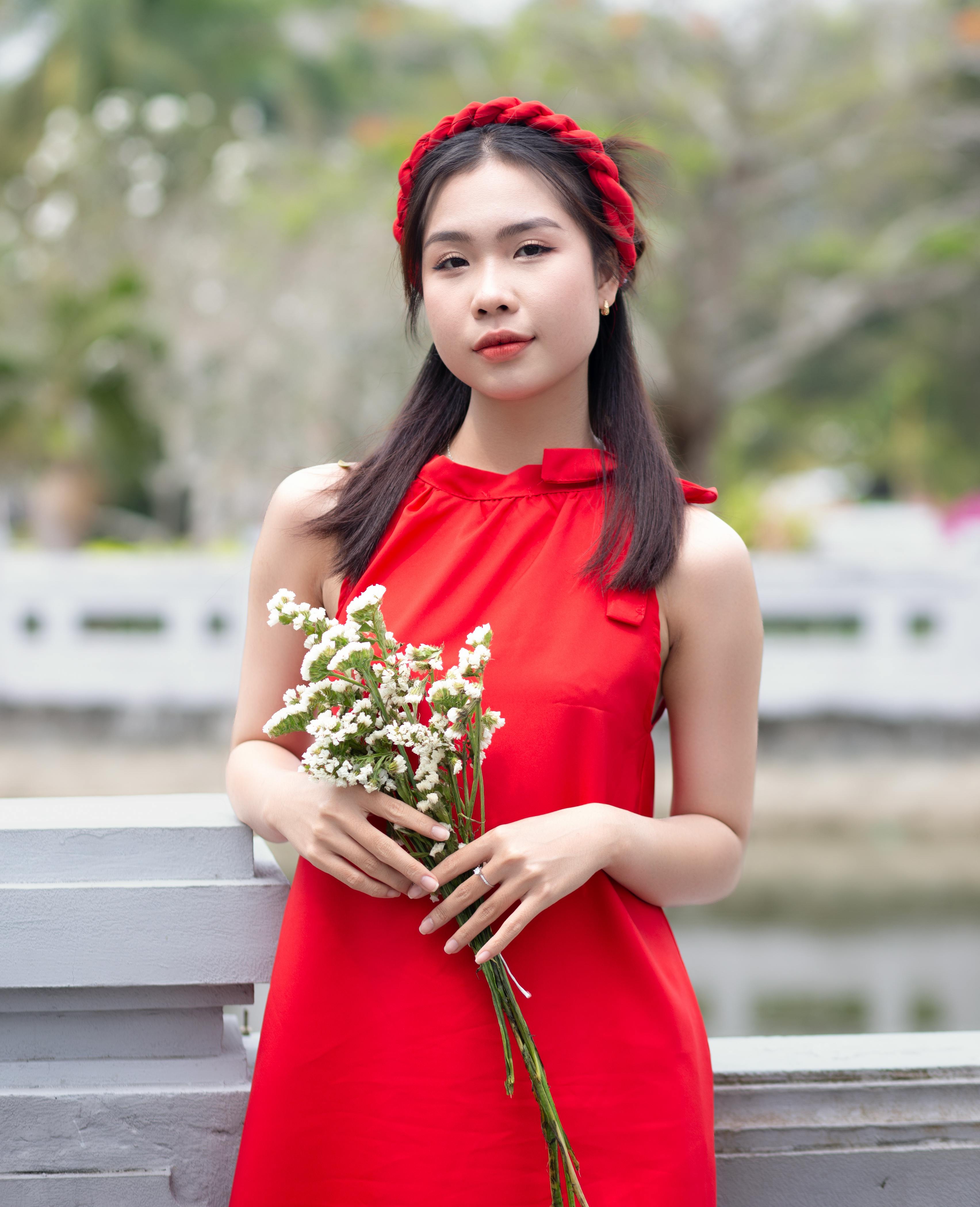 Model in Red Dress on Stairs · Free Stock Photo
