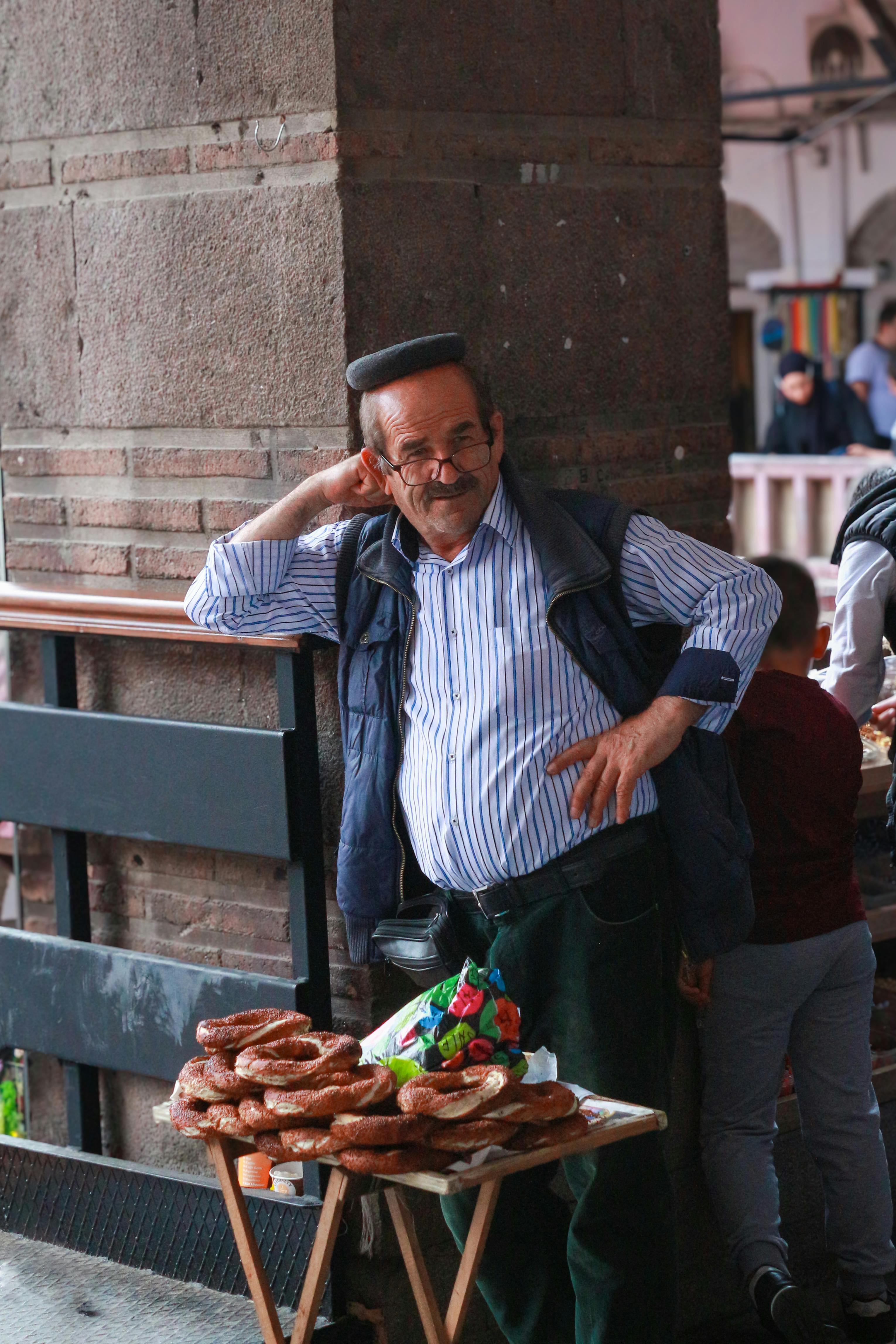A Man Selling Simit on a Street · Free Stock Photo