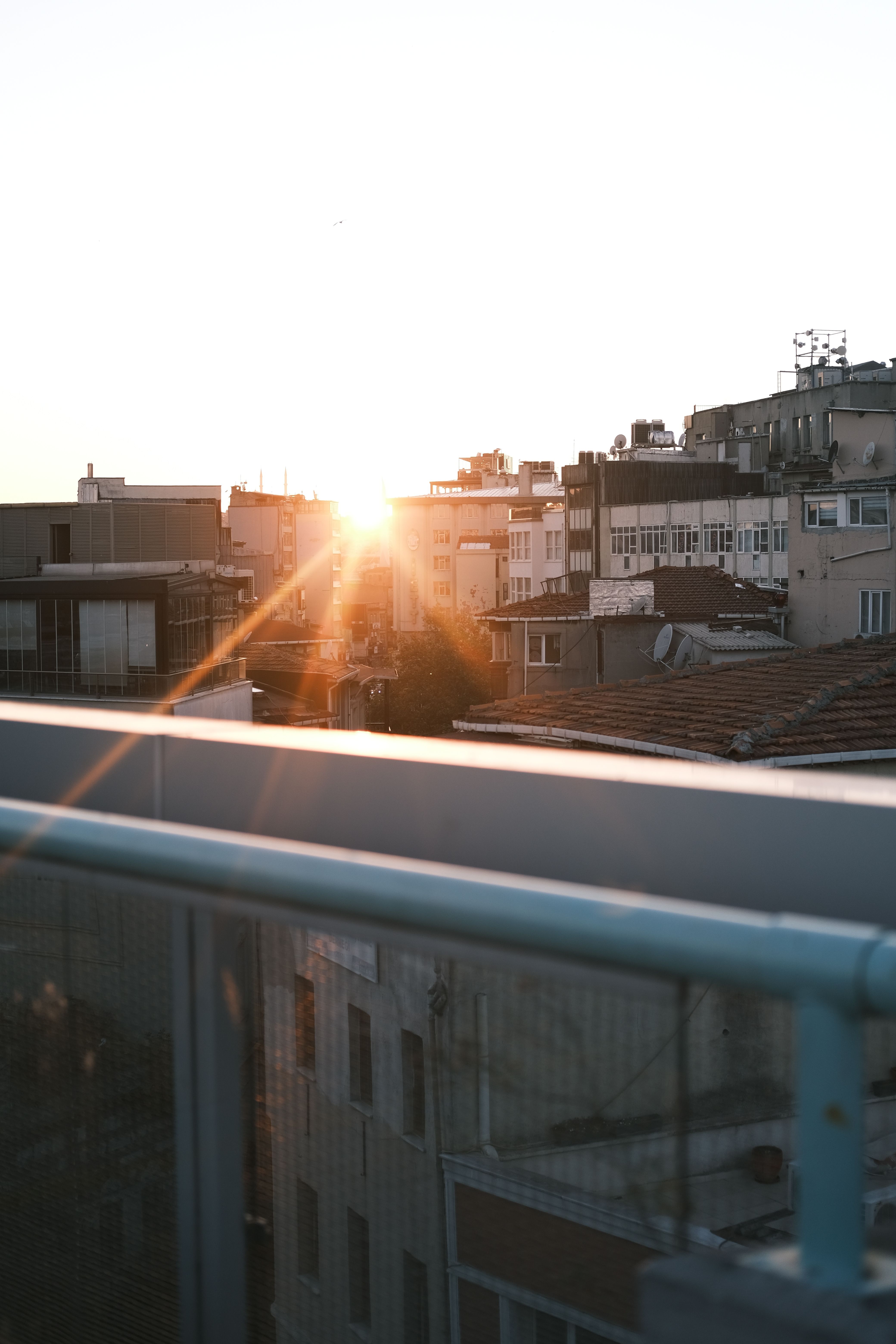 Sunset Sunlight over Town Buildings · Free Stock Photo