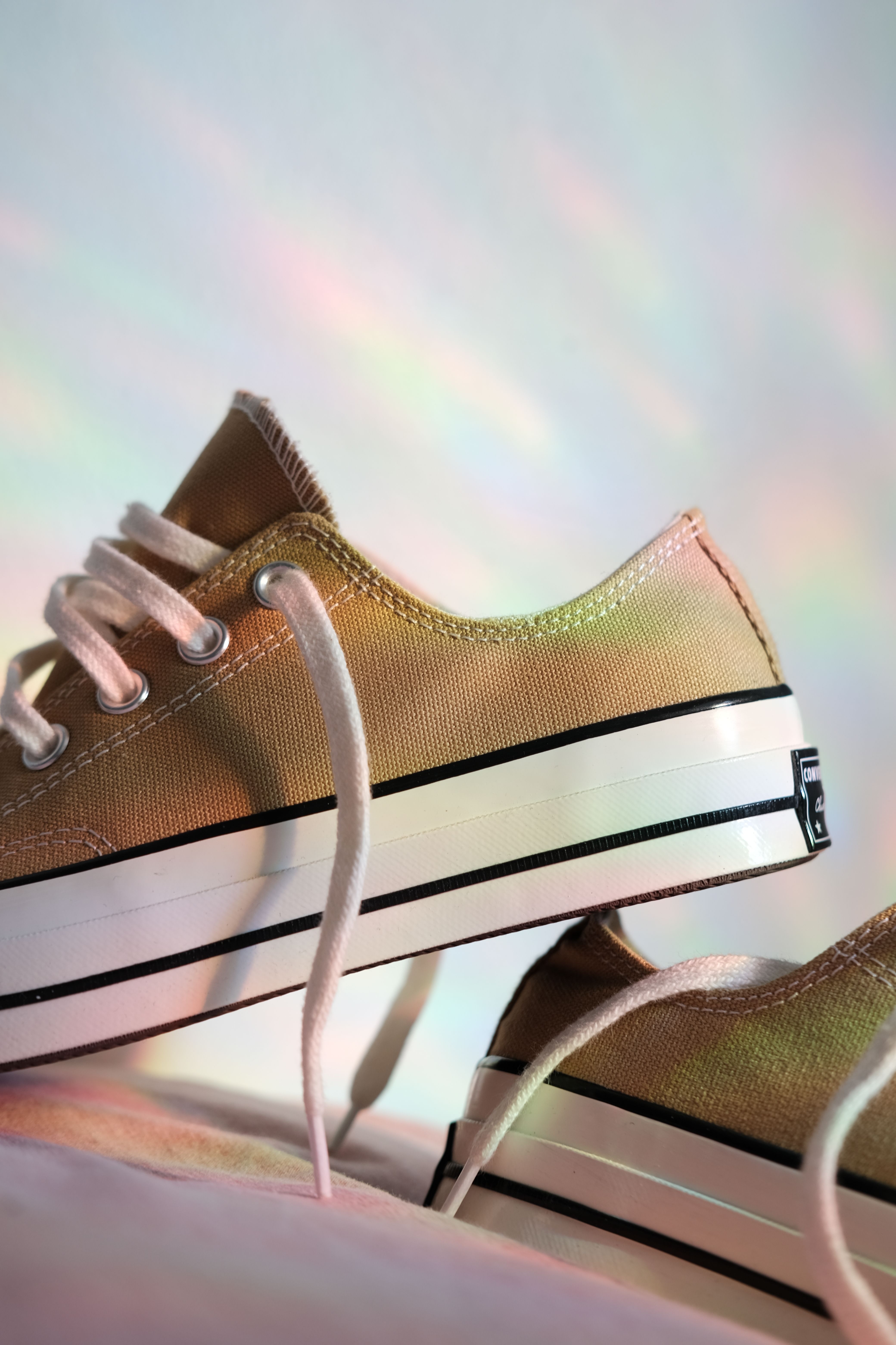 Brown Sneakers in Colorful Light · Free Stock Photo