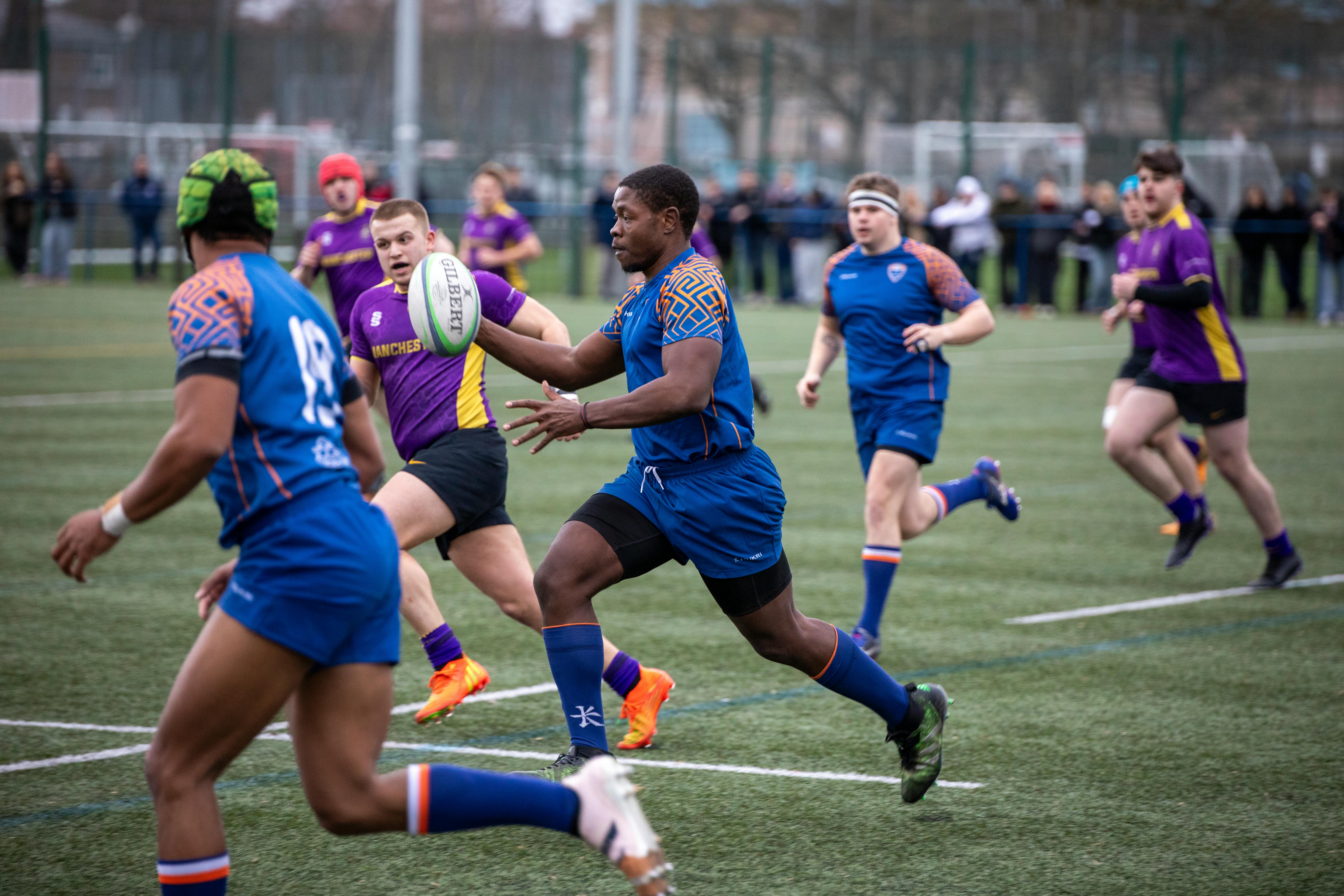 Rugby Players During a Match · Free Stock Photo