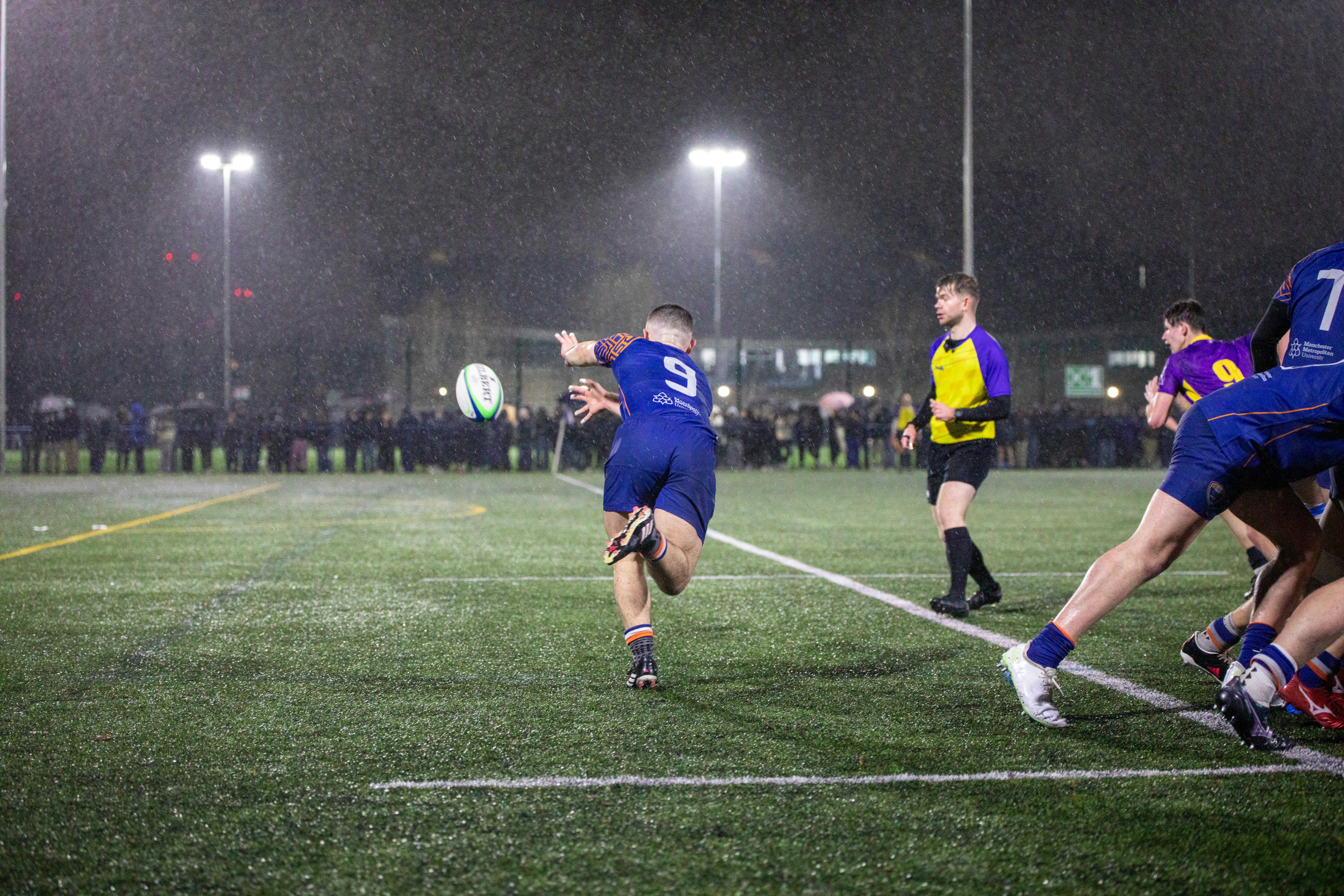 Player Catching Rugby Ball · Free Stock Photo