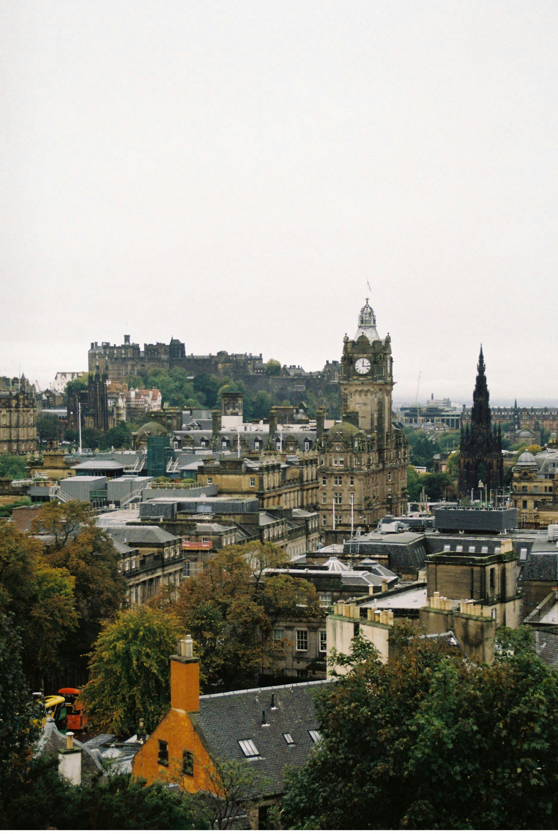 Photo of the Ferris Wheel and the Scott Monument in Edinburgh, Scotland ...
