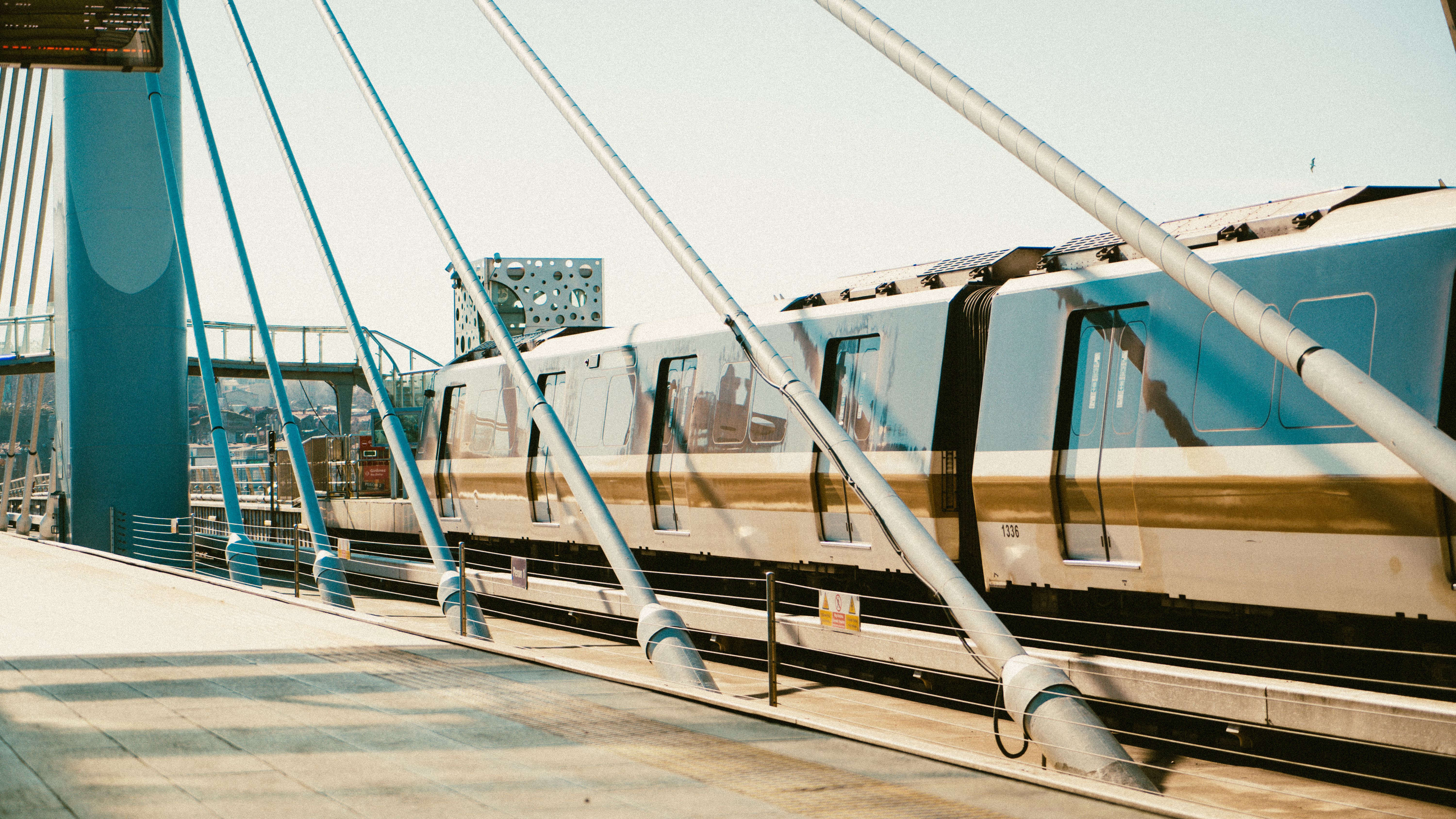 Metro Train on Bridge · Free Stock Photo