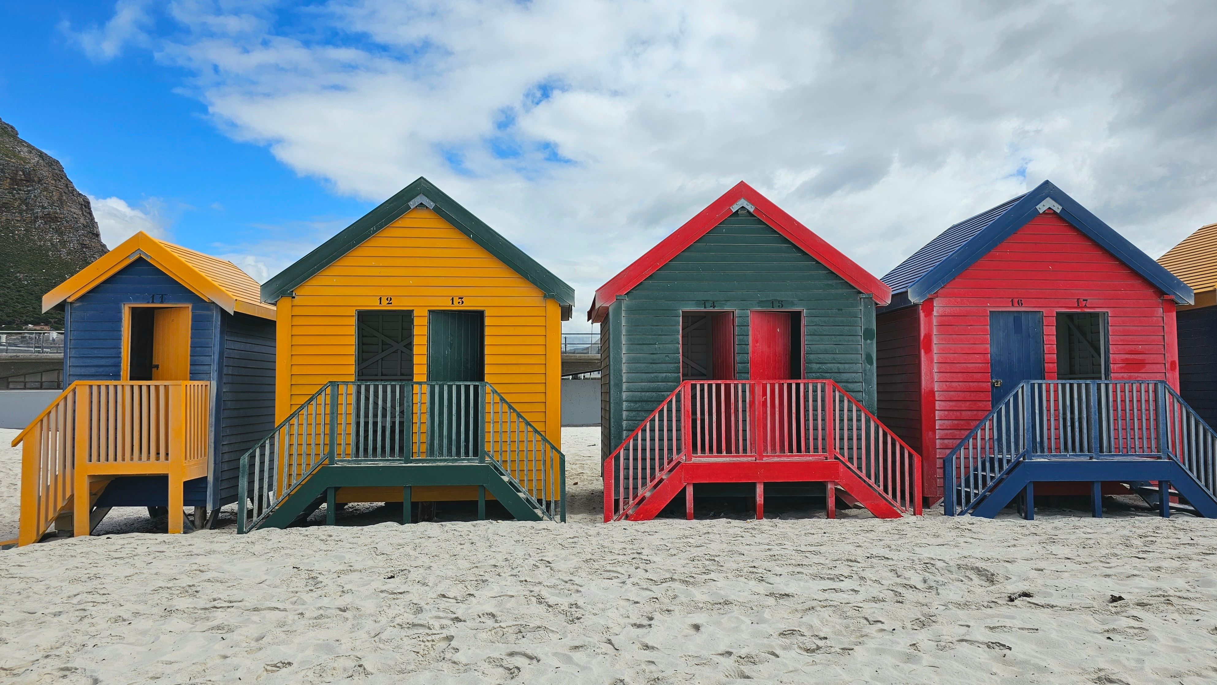 Row of Wooden Huts on Beach · Free Stock Photo