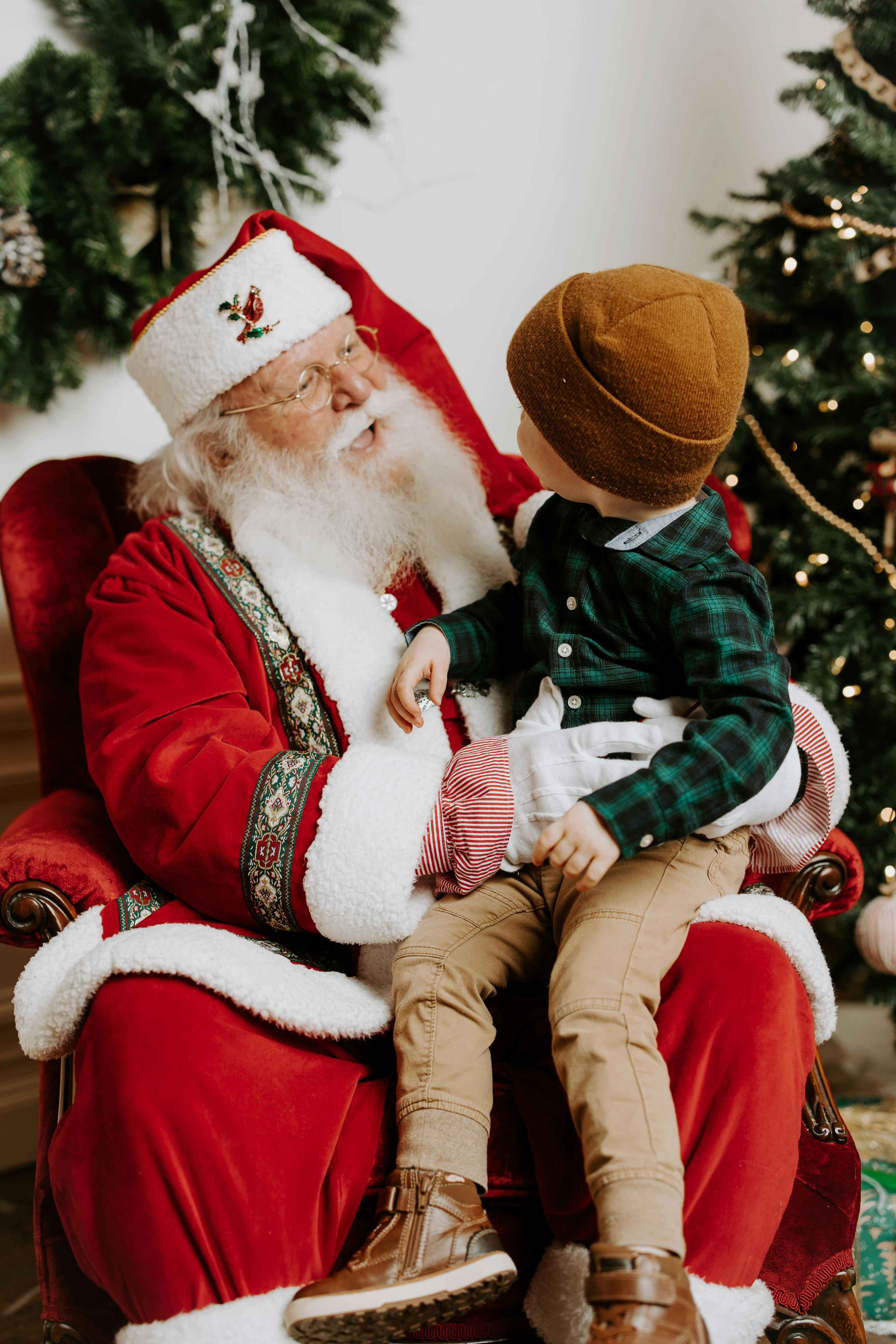 A Kid with Santa Claus · Free Stock Photo