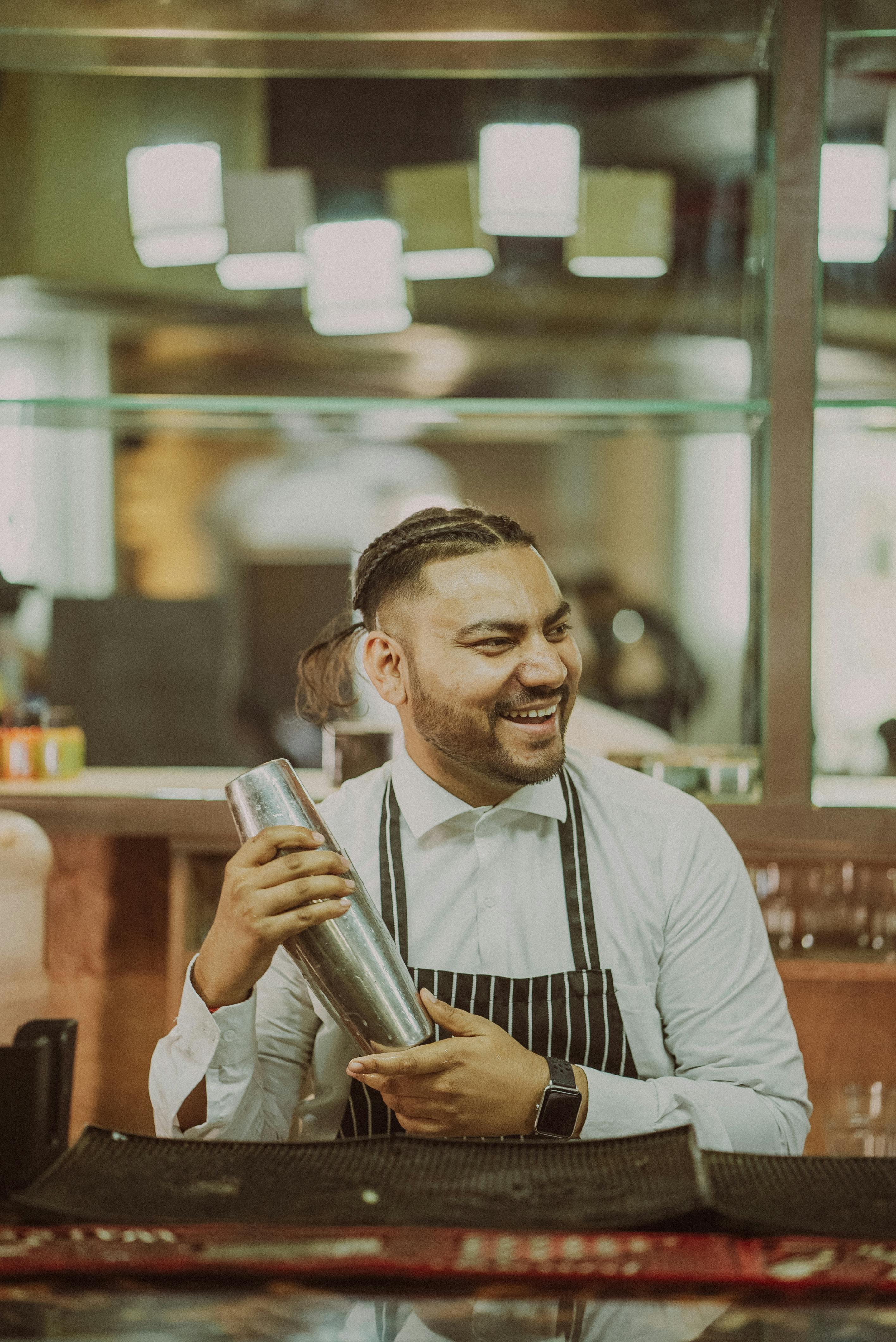 Cheerful Smiling Barman · Free Stock Photo