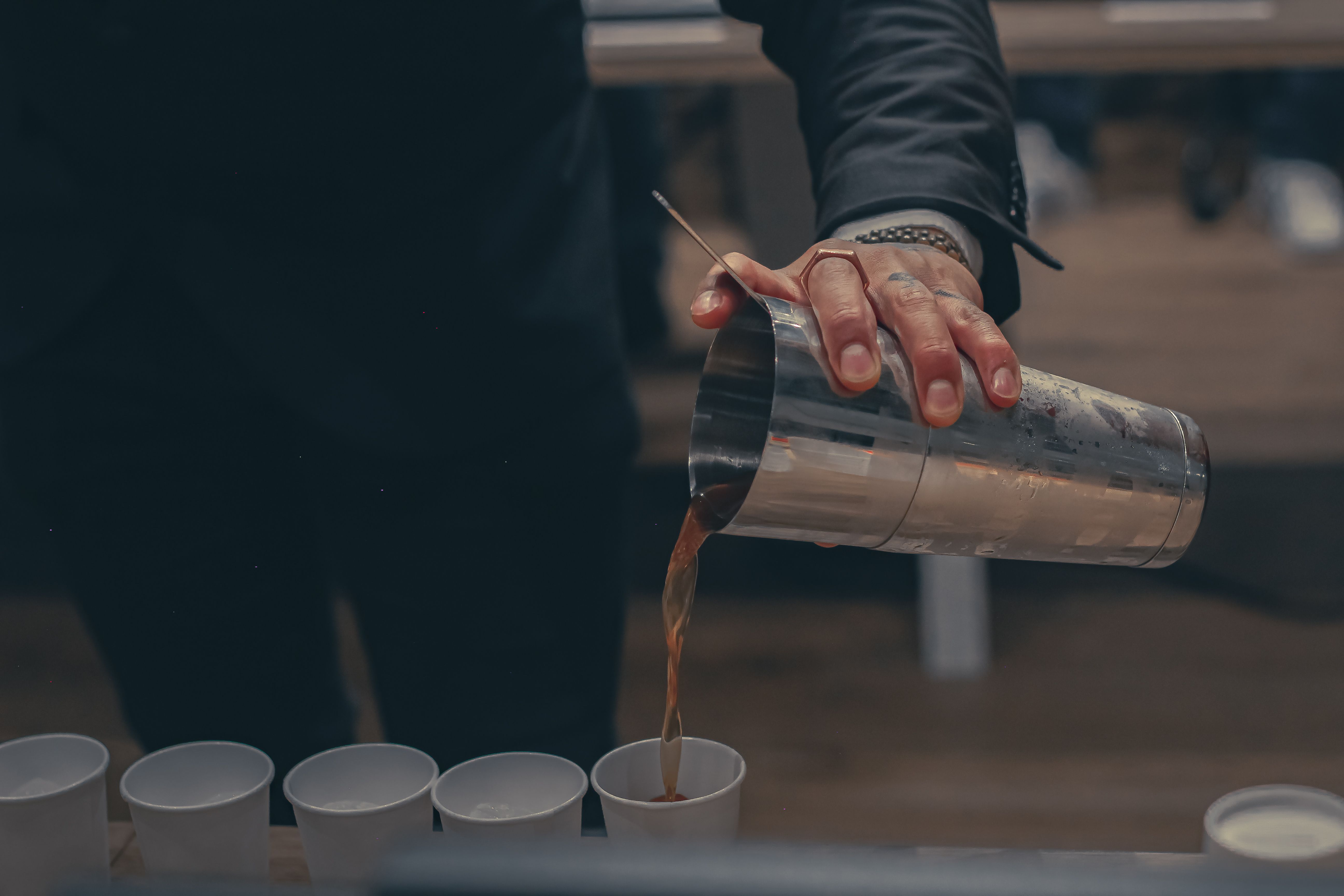 Man Hand Pouring Tea to Cups · Free Stock Photo