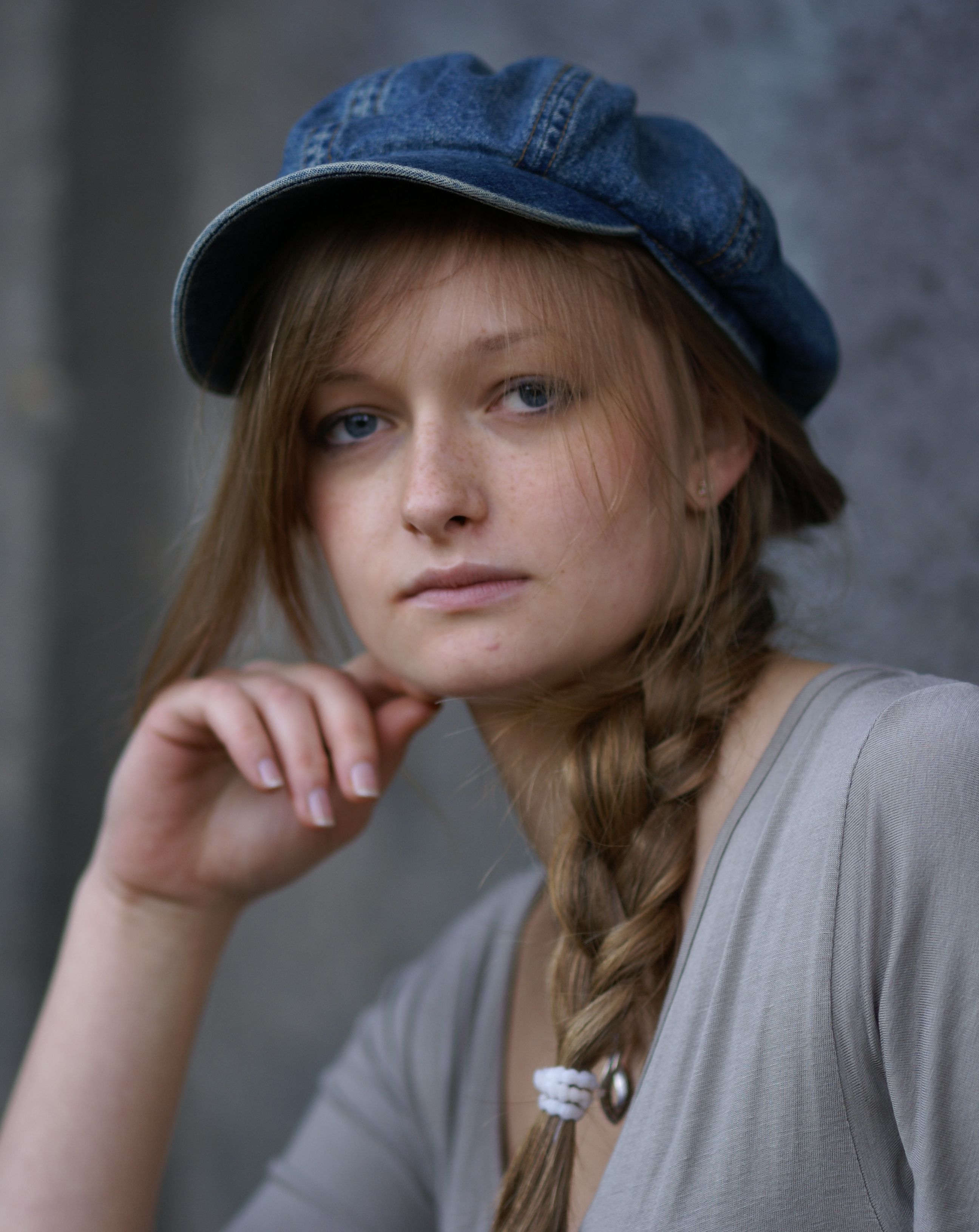 A young woman with a hat on her head · Free Stock Photo