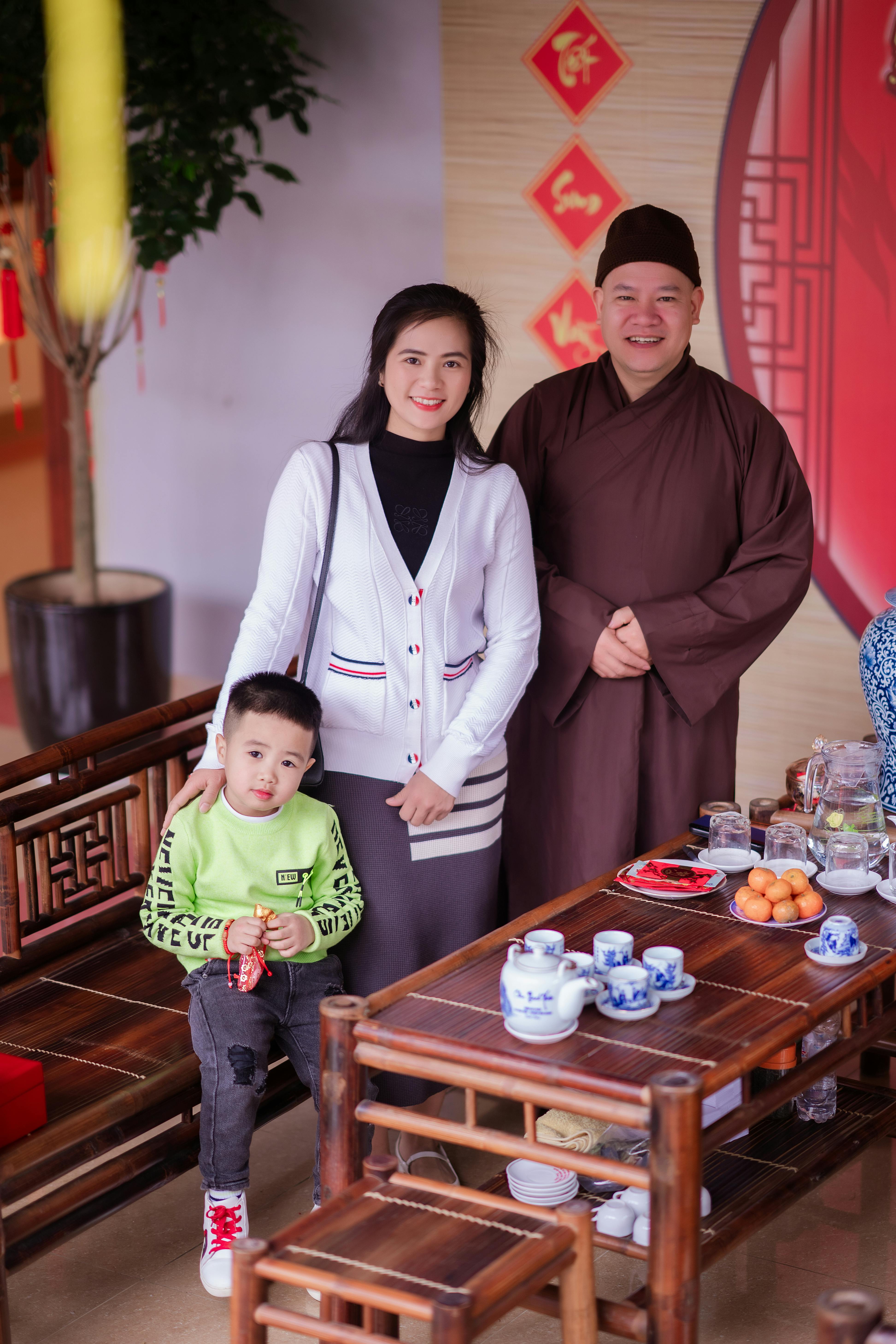 Man in Traditional Clothing and Woman with Son · Free Stock Photo