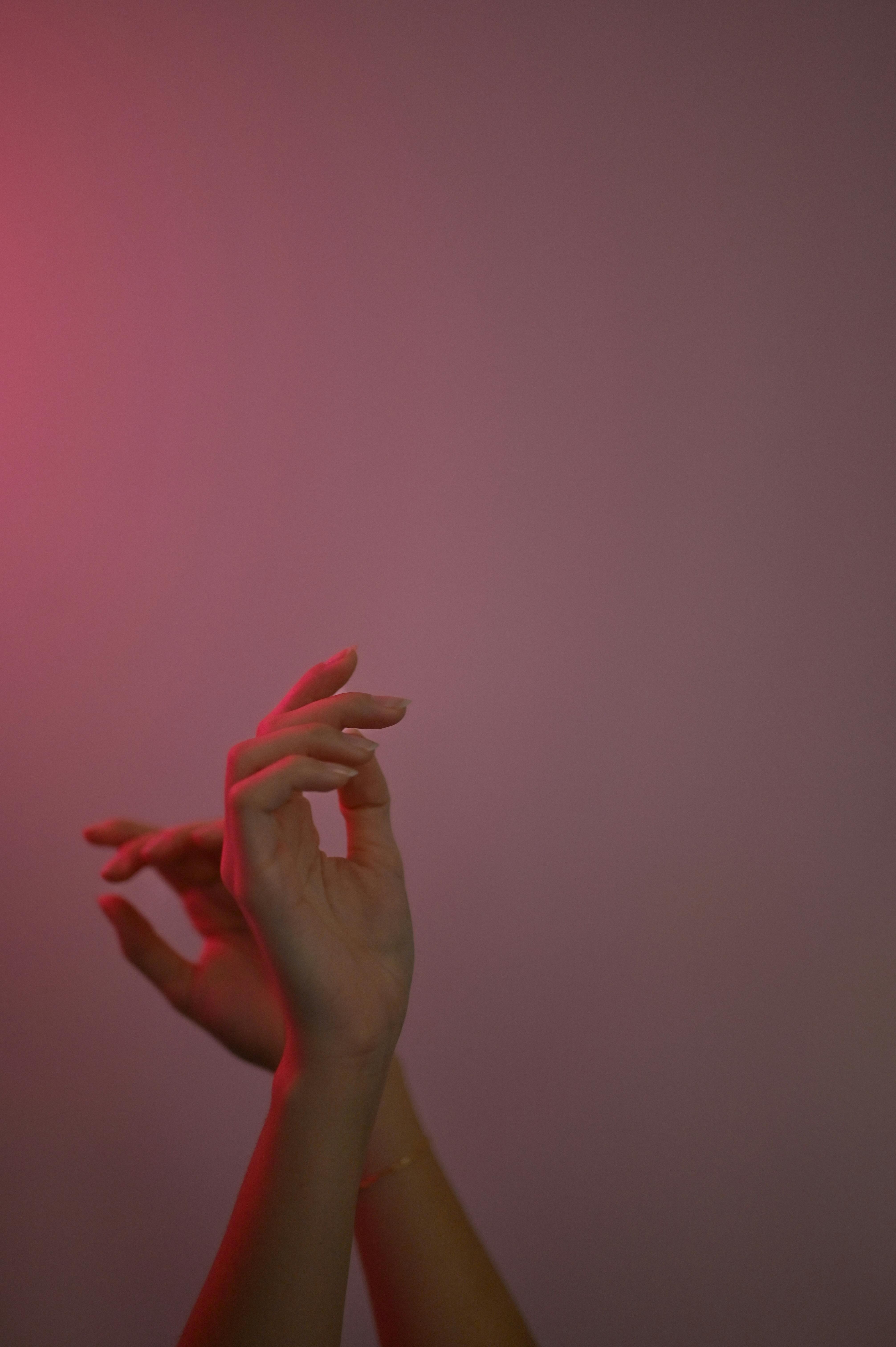 Hands against Gradient Background · Free Stock Photo