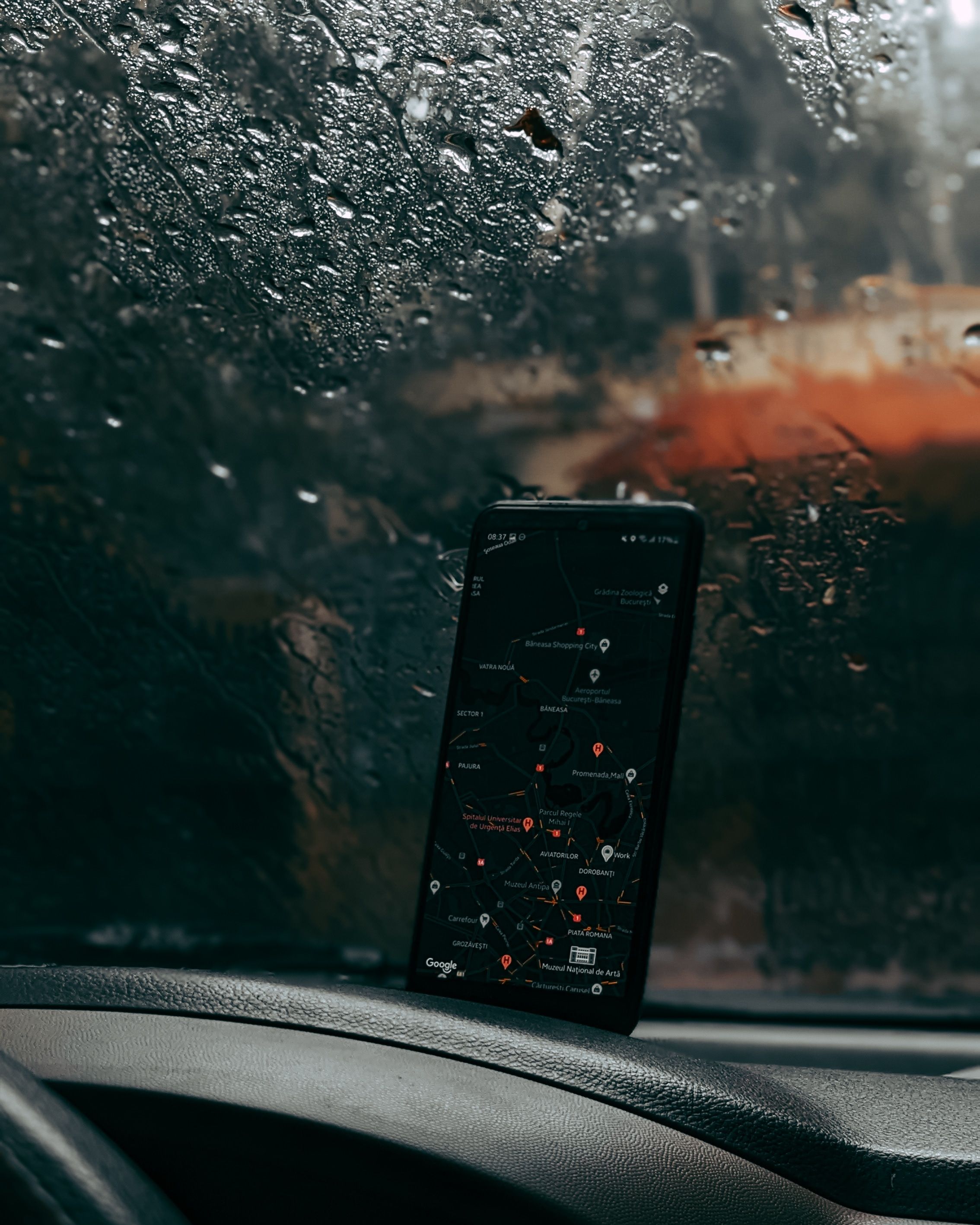 Phone Navigation in a Car During Rain · Free Stock Photo