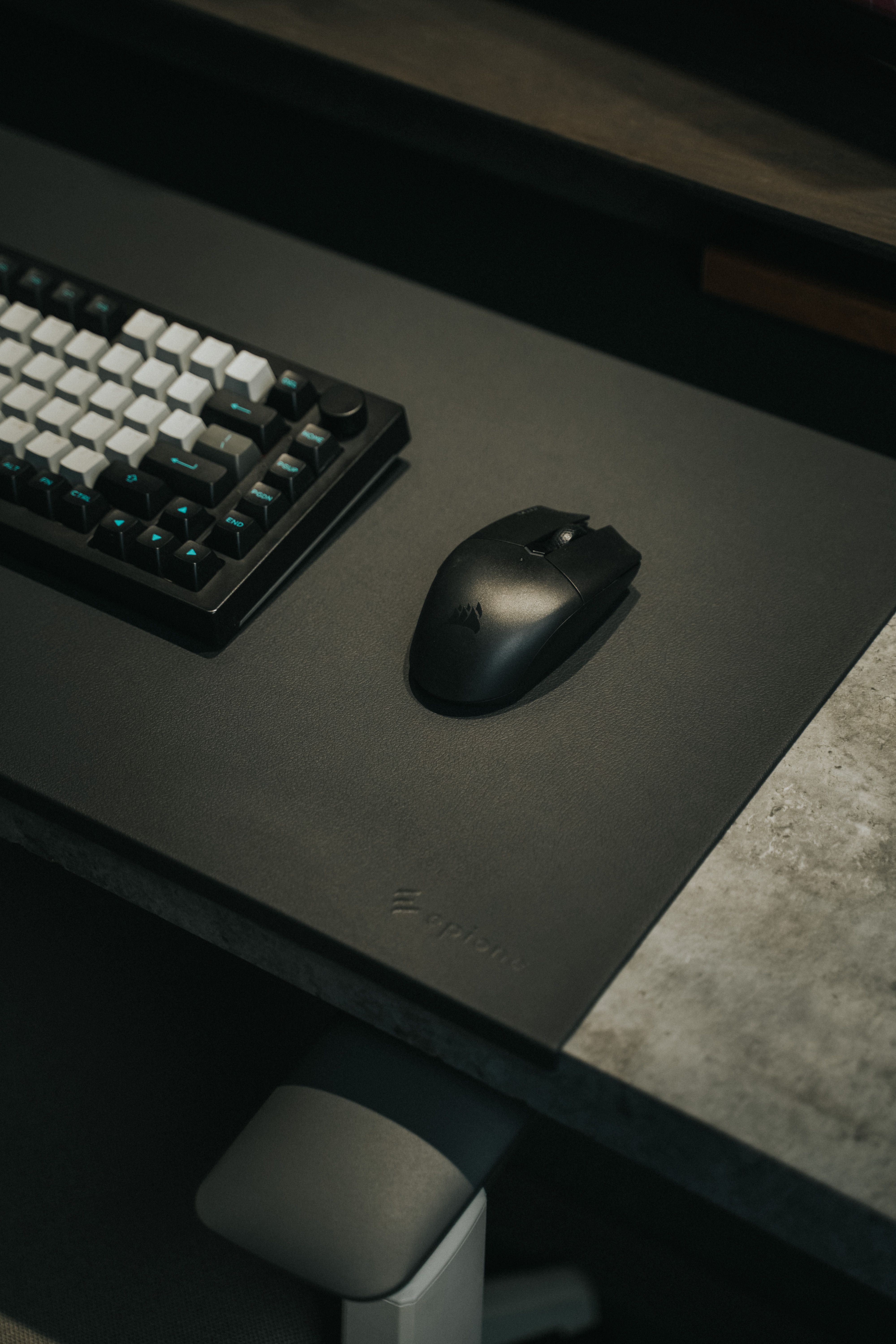 A black keyboard and mouse on a desk · Free Stock Photo