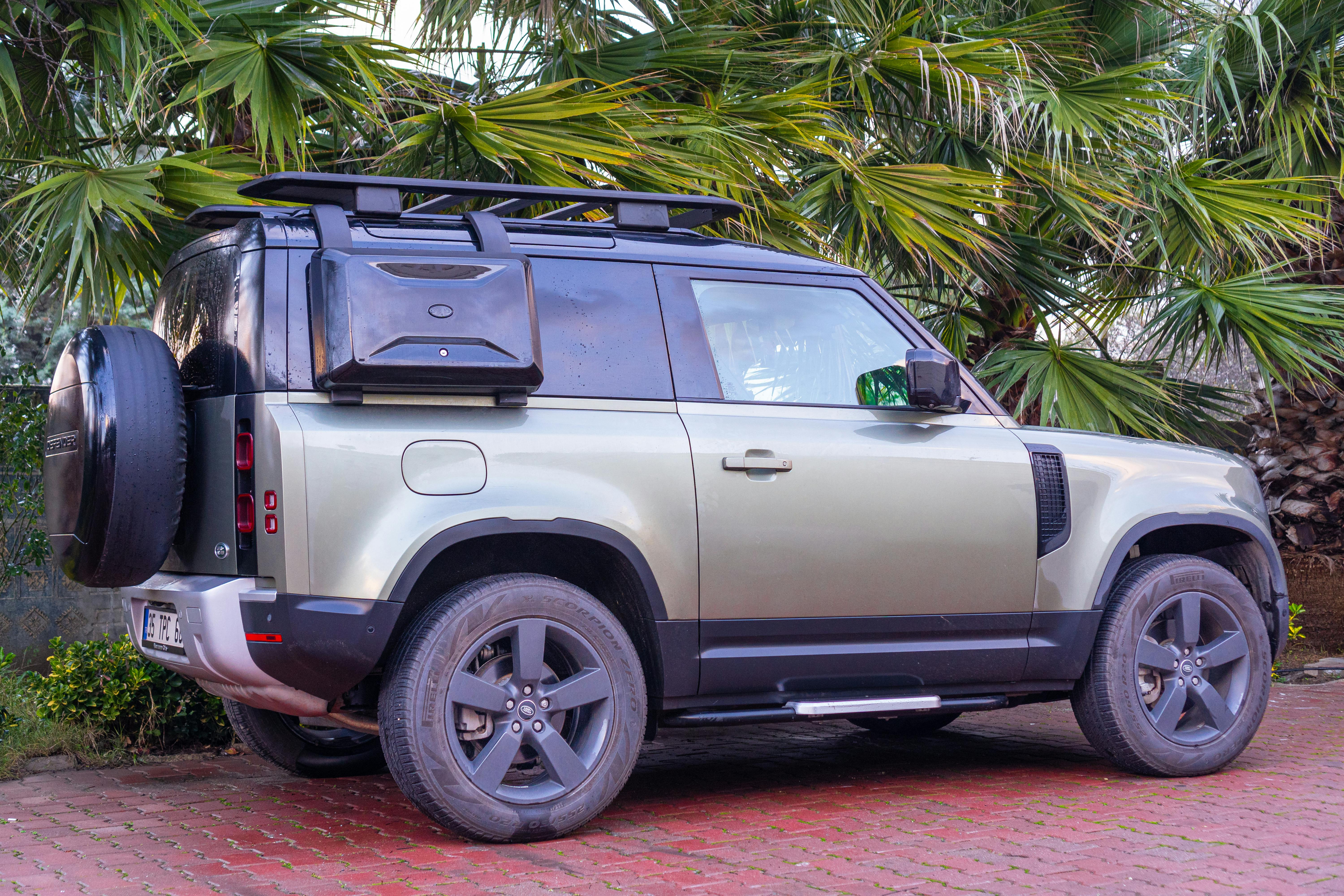 Parked Green Land Rover Defender L663 · Free Stock Photo