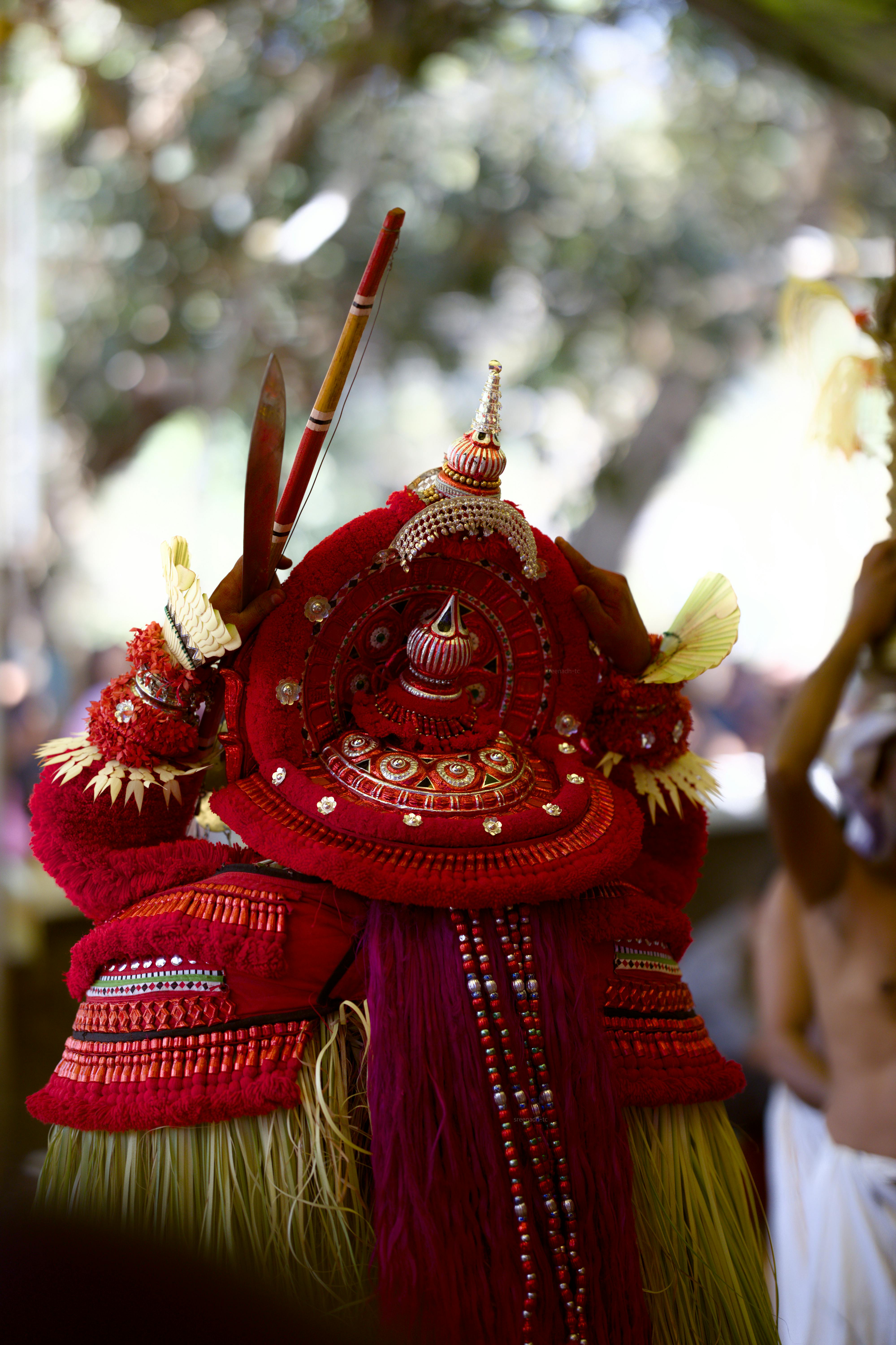 Ceremonial Red Headpiece on Head · Free Stock Photo