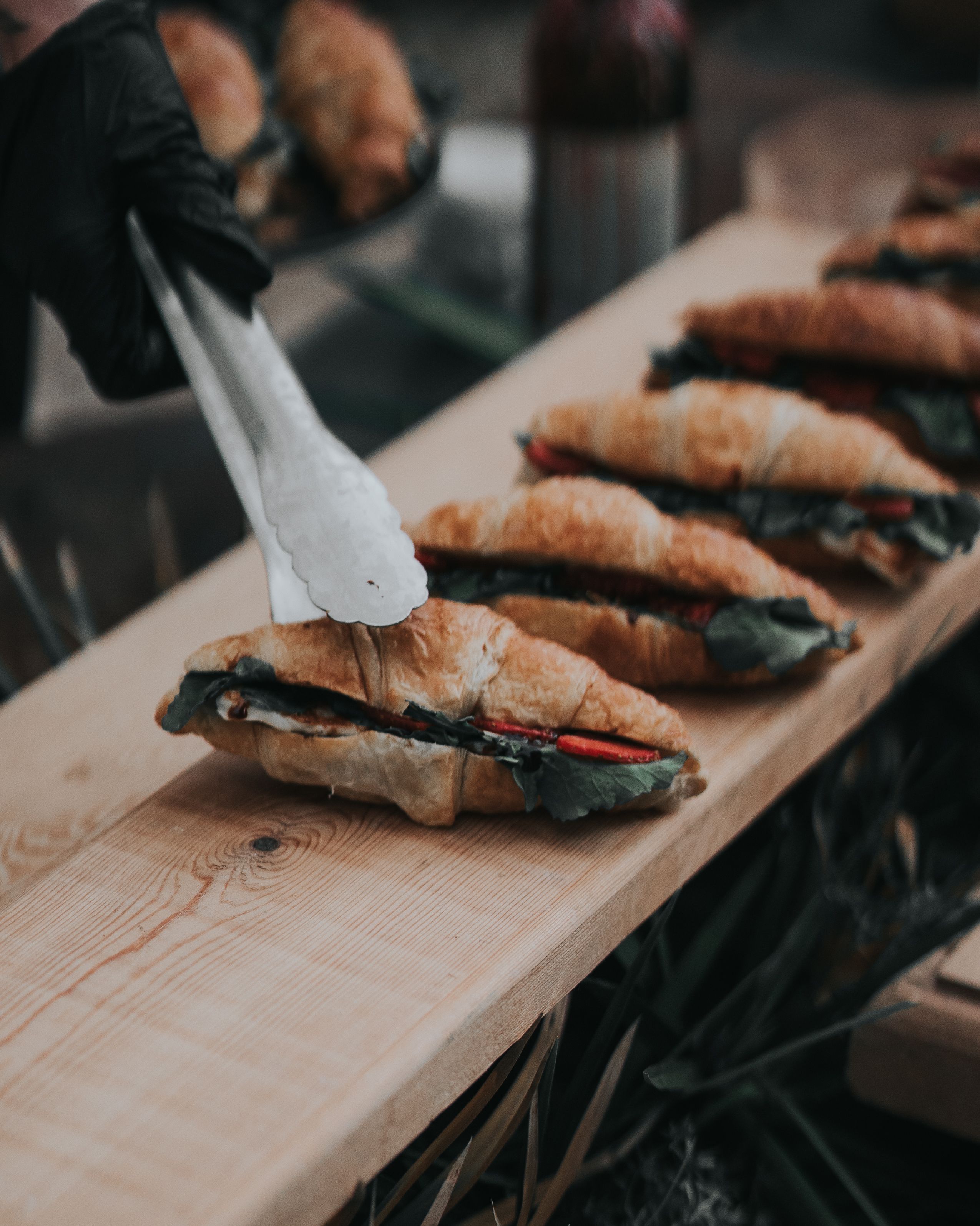Person Holding Tongs · Free Stock Photo