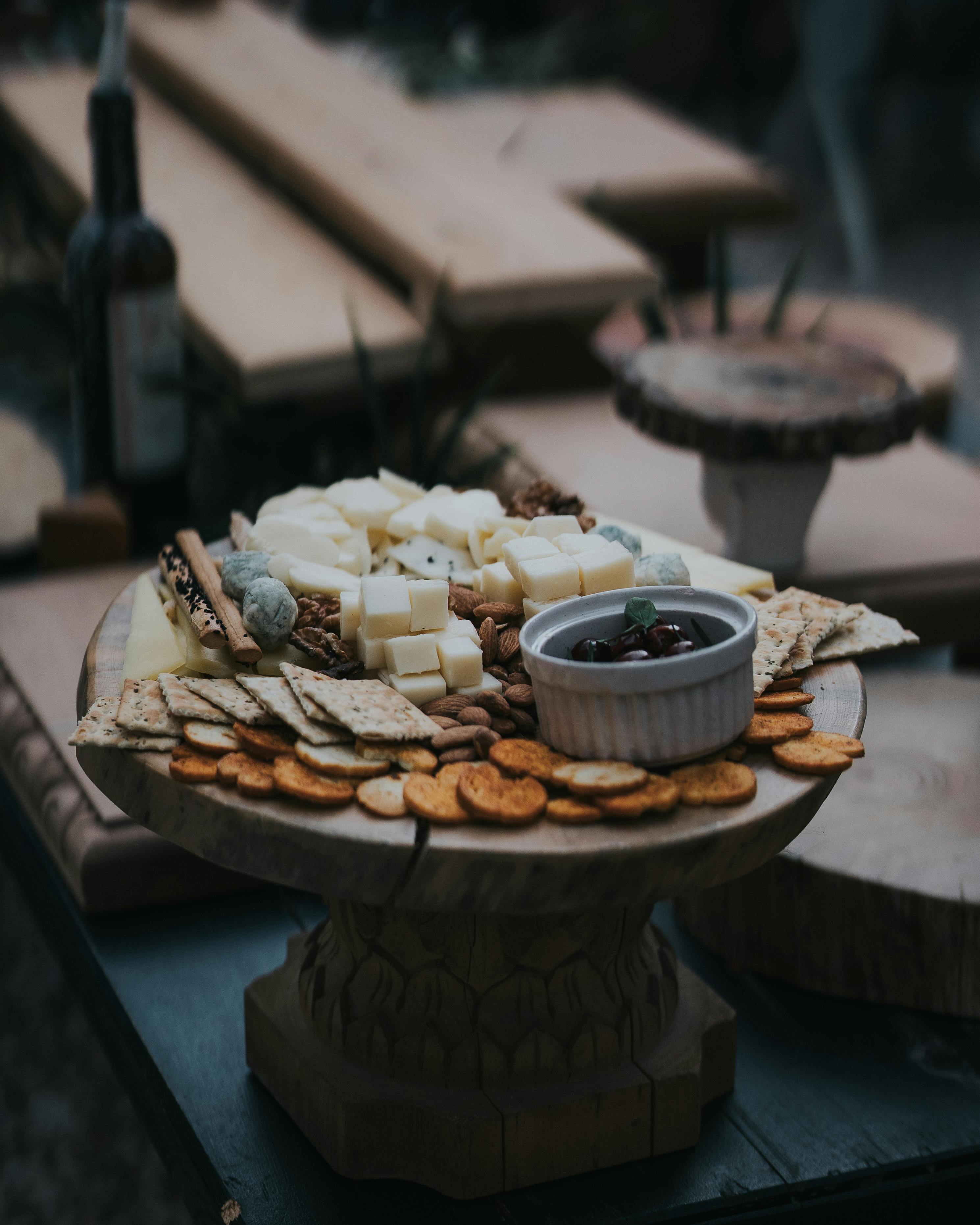 Dry Snacks Laid Out on a Wooden Board · Free Stock Photo