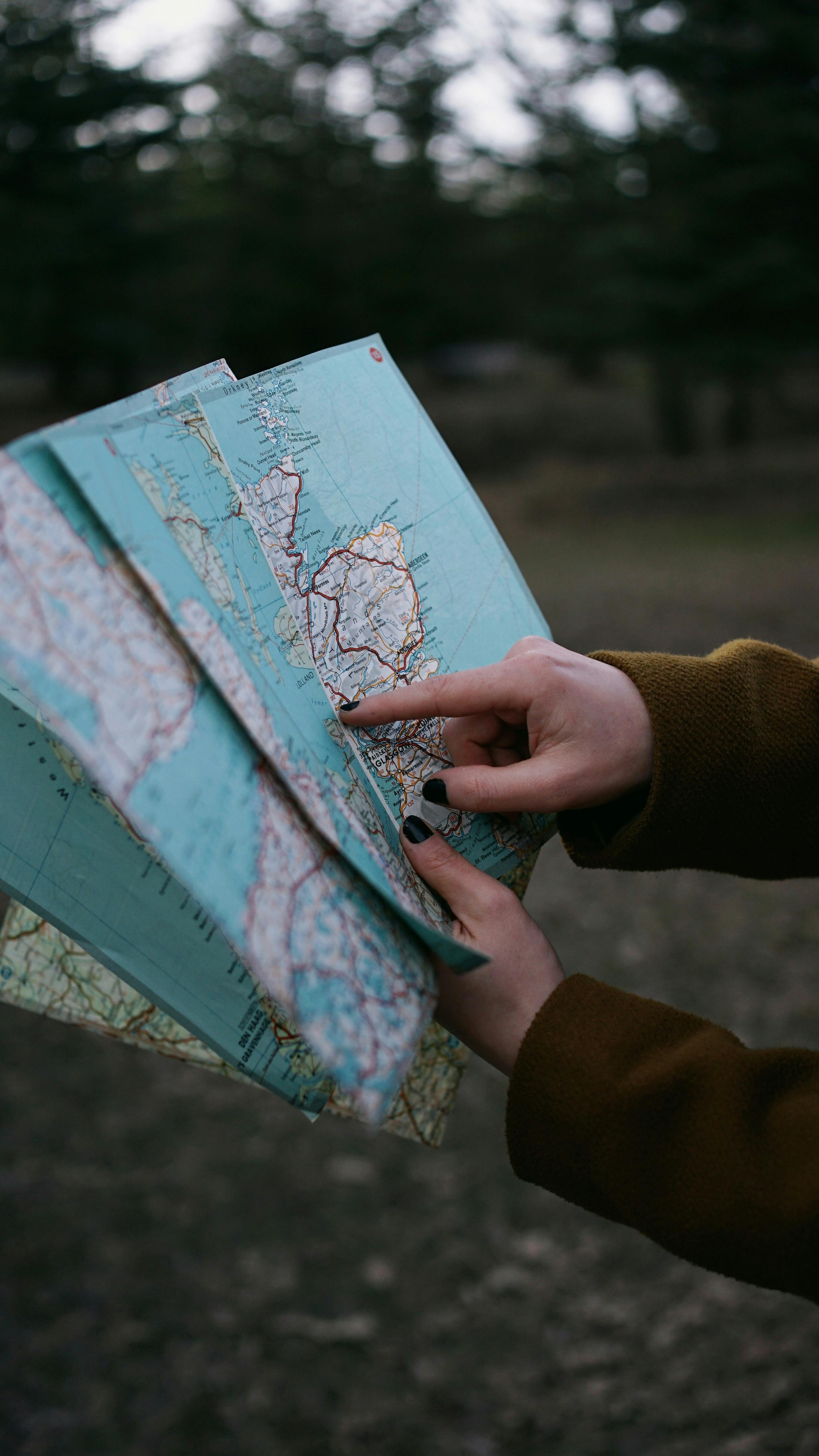 Woman Hands Holding Map · Free Stock Photo